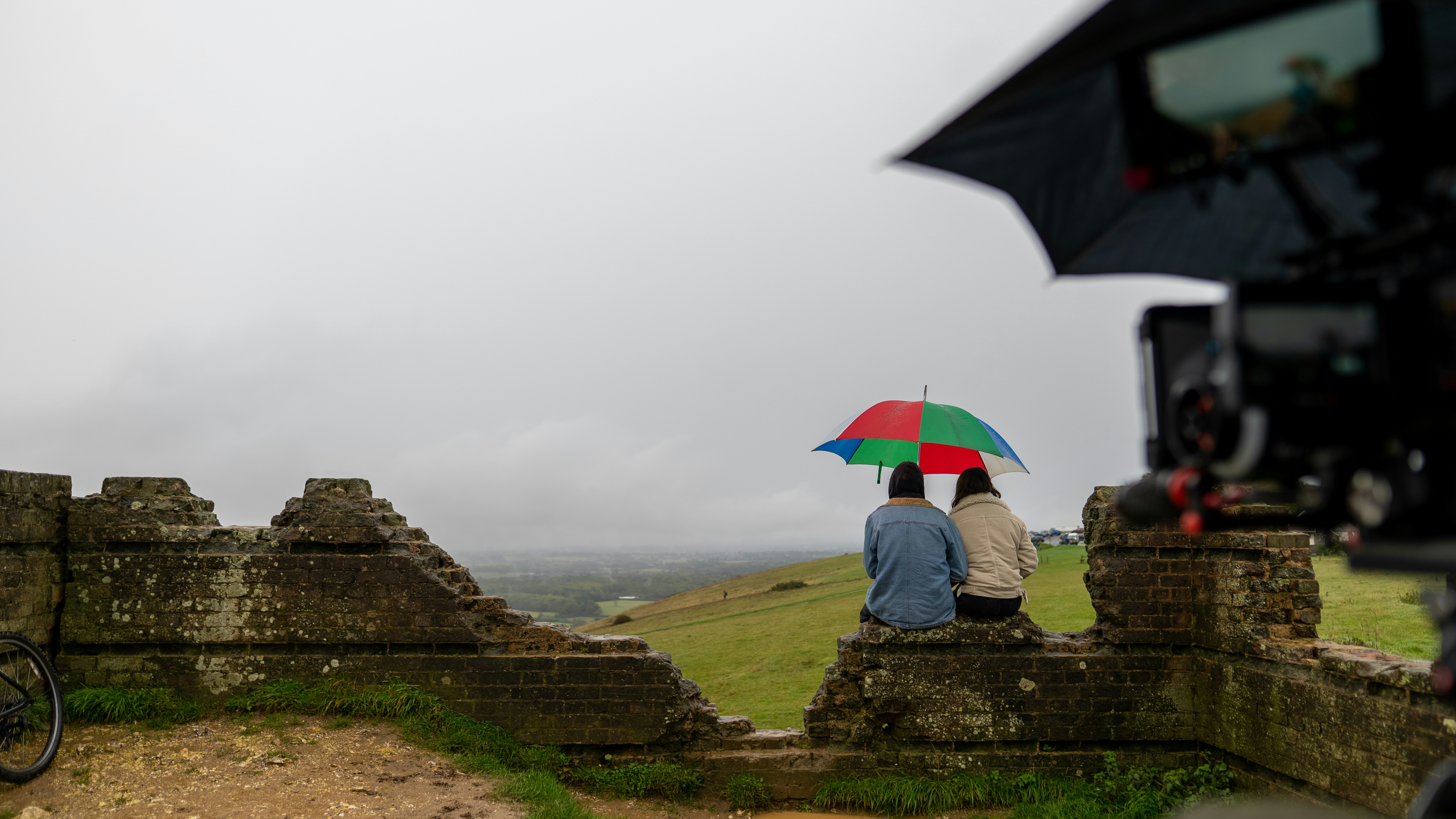 Umbrella Over the Ramparts: A Quiet Hilltop Moment