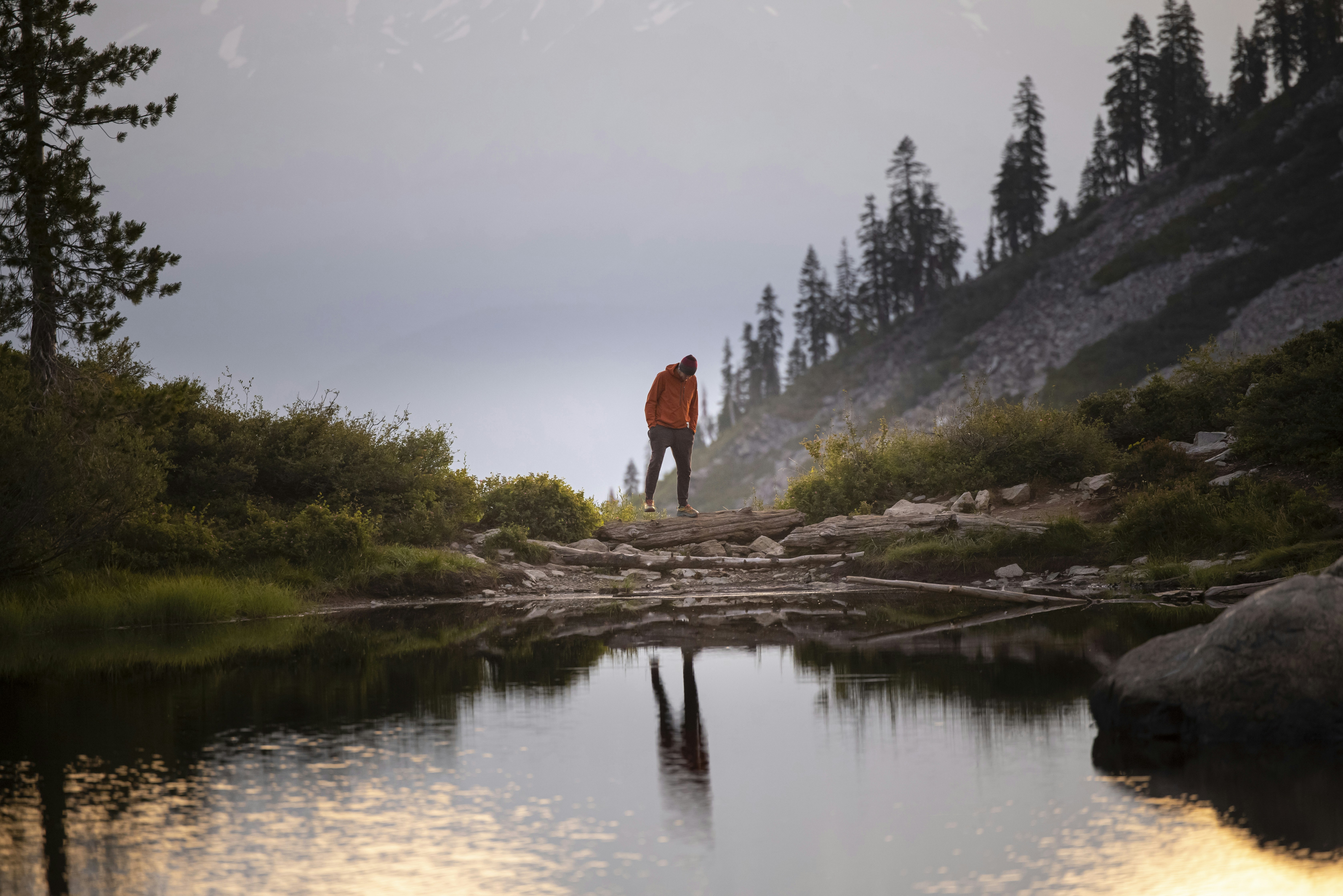 Lone Traveler at the Basin Edge