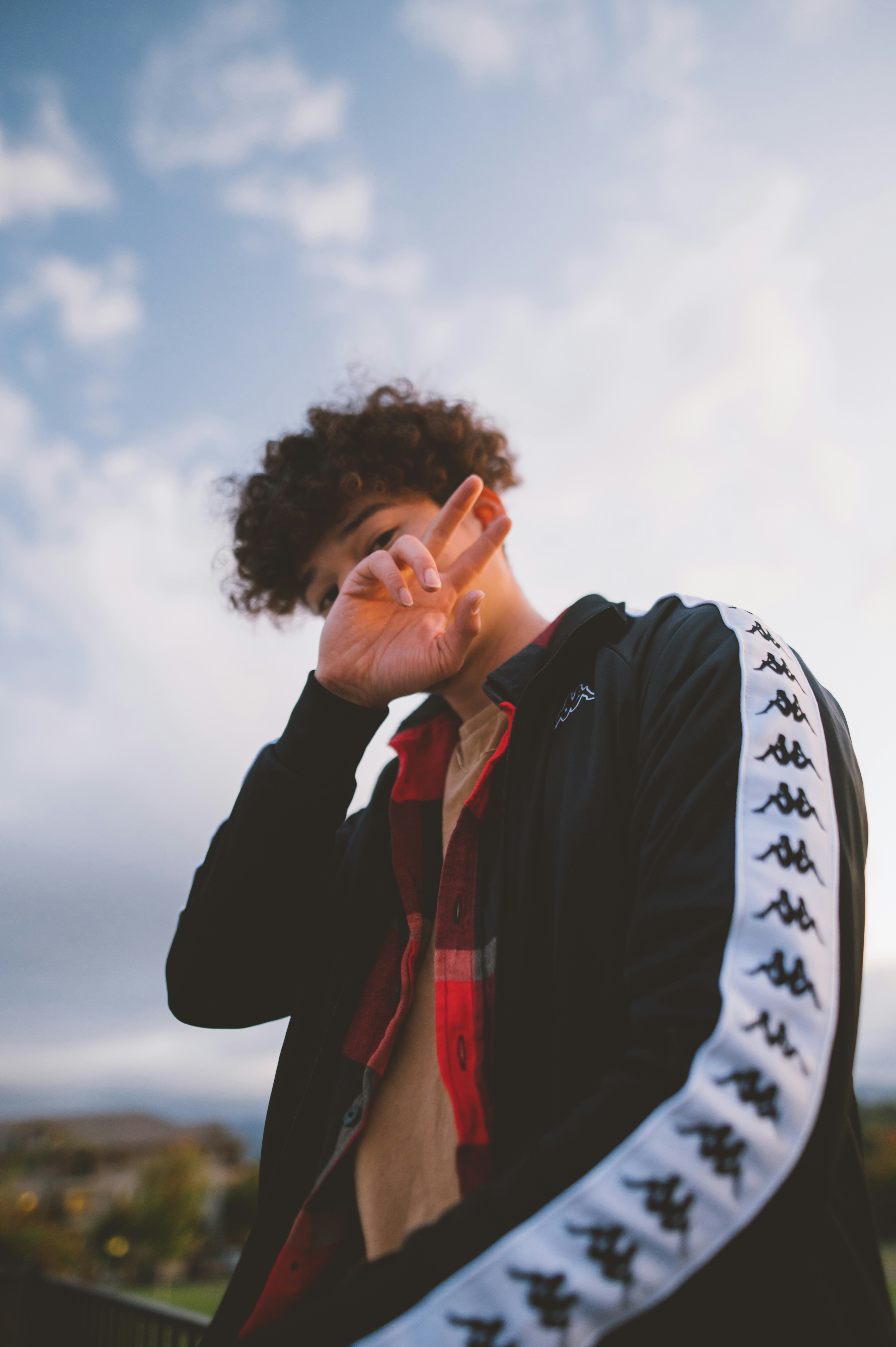 Man in black jacket covering his face with his hand photo – Free Human ...