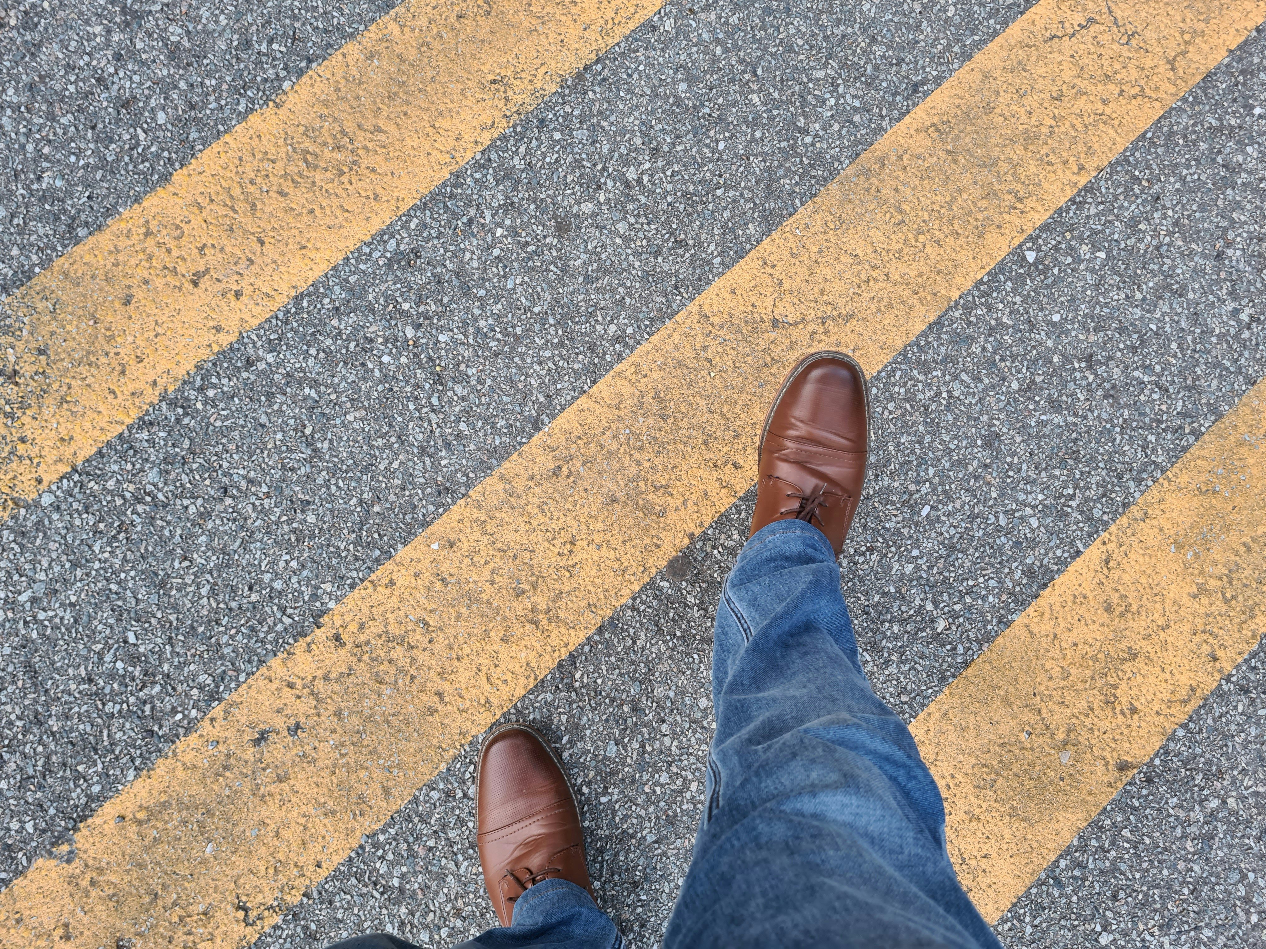 Footsteps Between Diagonal Stripes: Street-Level Composition