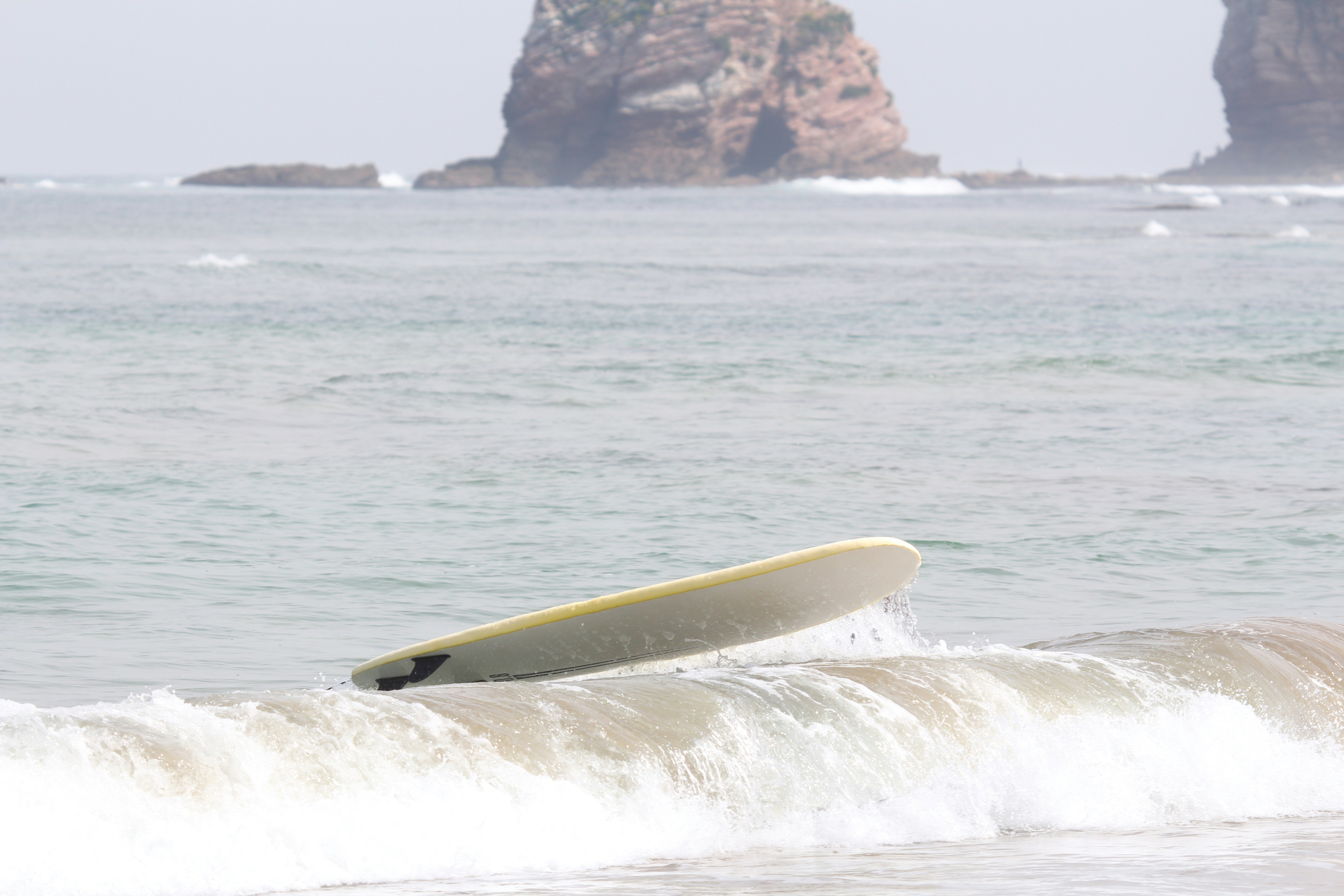 Yellow surfboard on sea during daytime photo – Free France Image on ...