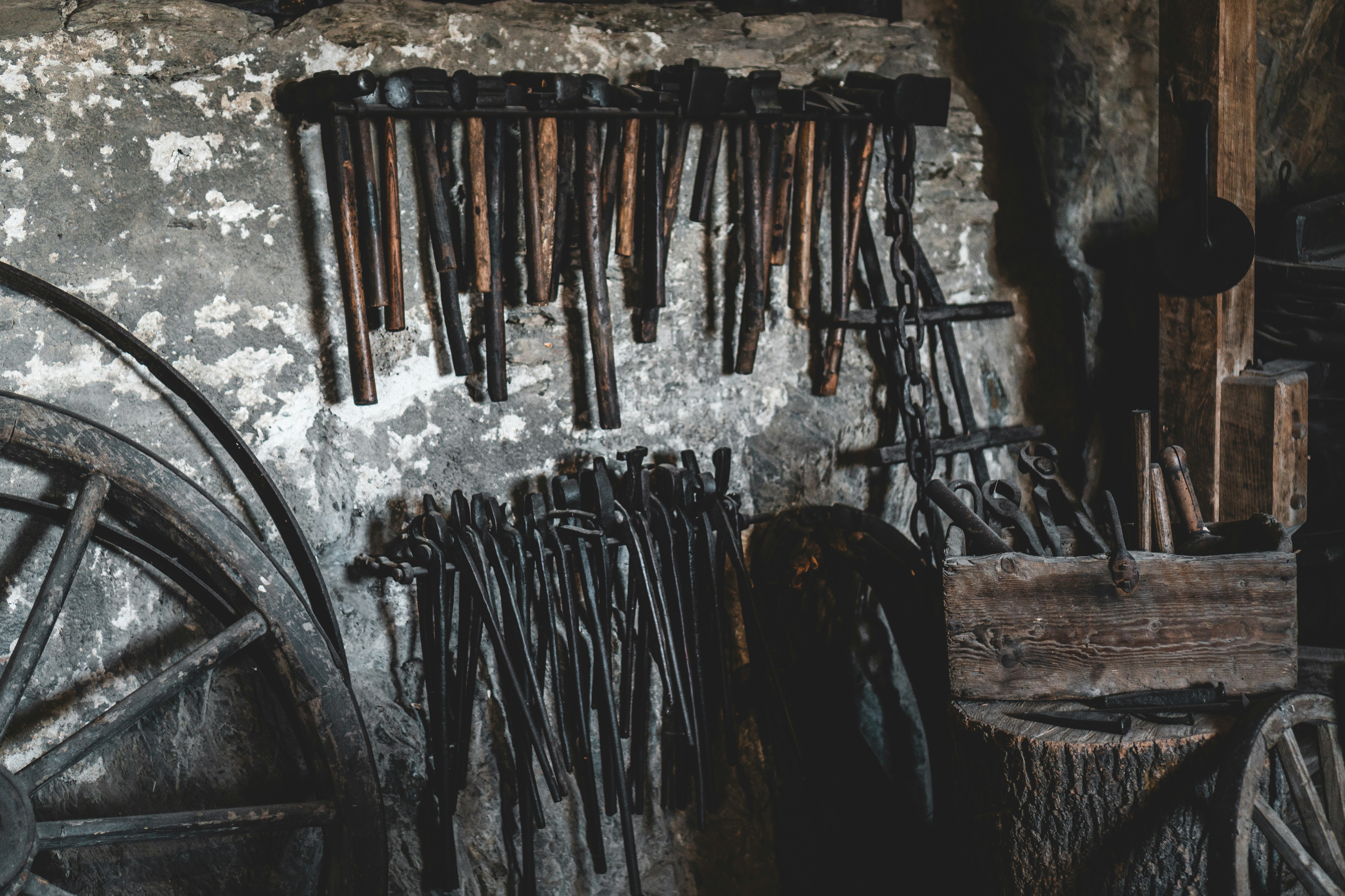 went for a trip to the Marksburg and fell in love with the forge. take a deep breath and smell history.  | black metal tool on brown wooden table