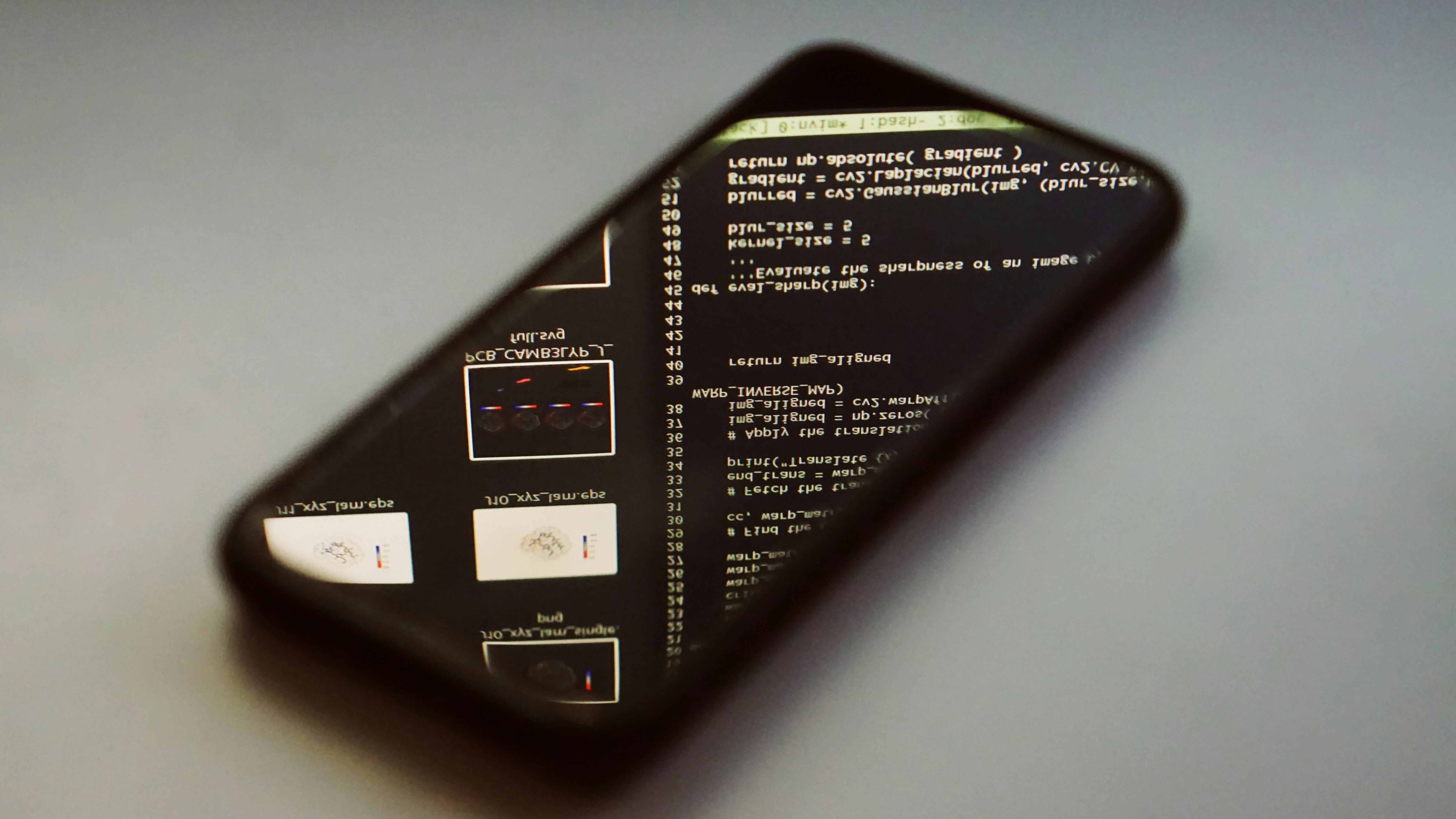 Black android smartphone on white table photo – Free Black Image on ...