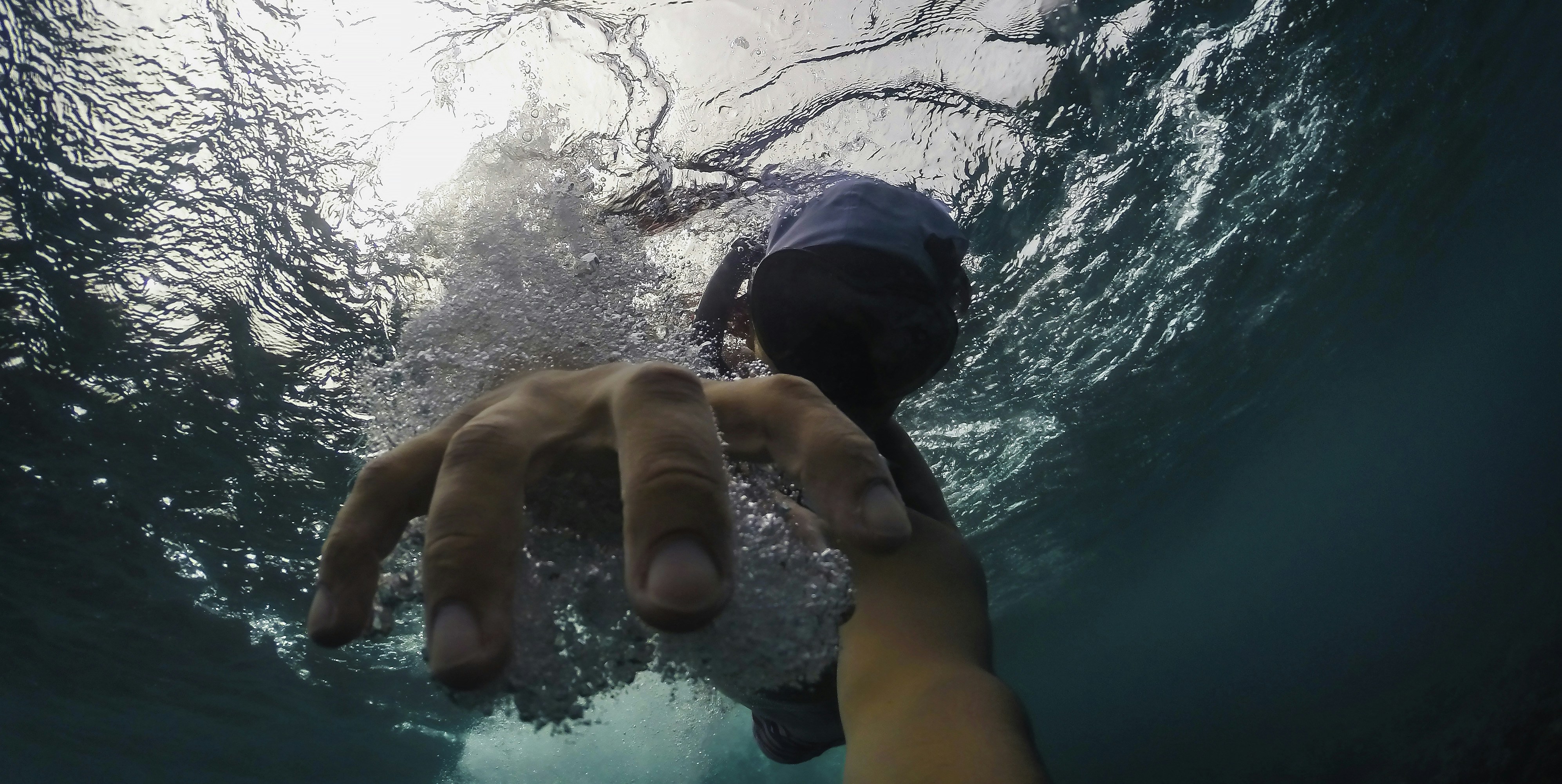 Outstretched Reach: Underwater Gaze Toward the Surface