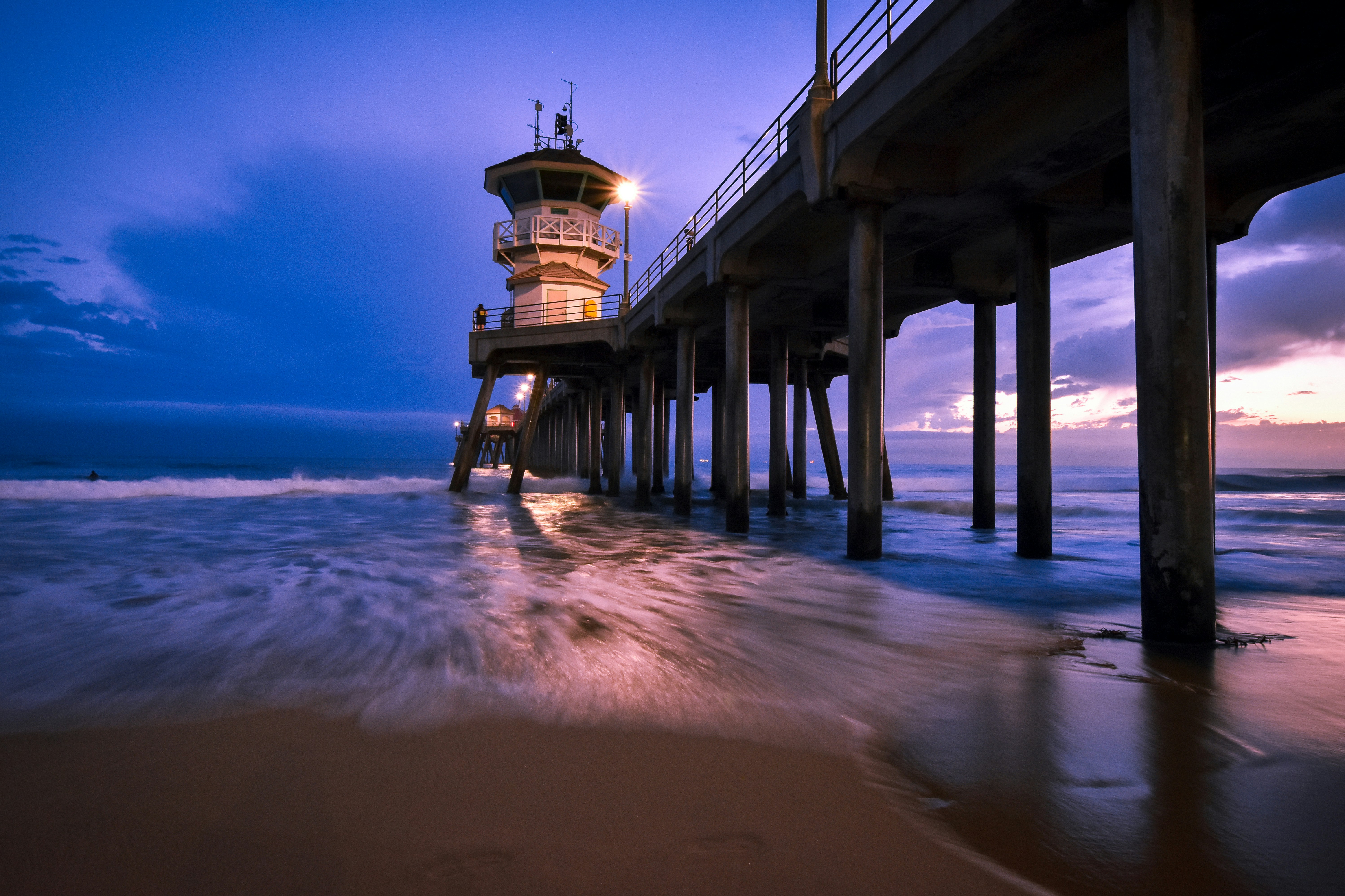 Blue-hour Beacon Over the Pier: Long-exposure at the Wave-washed Jetty