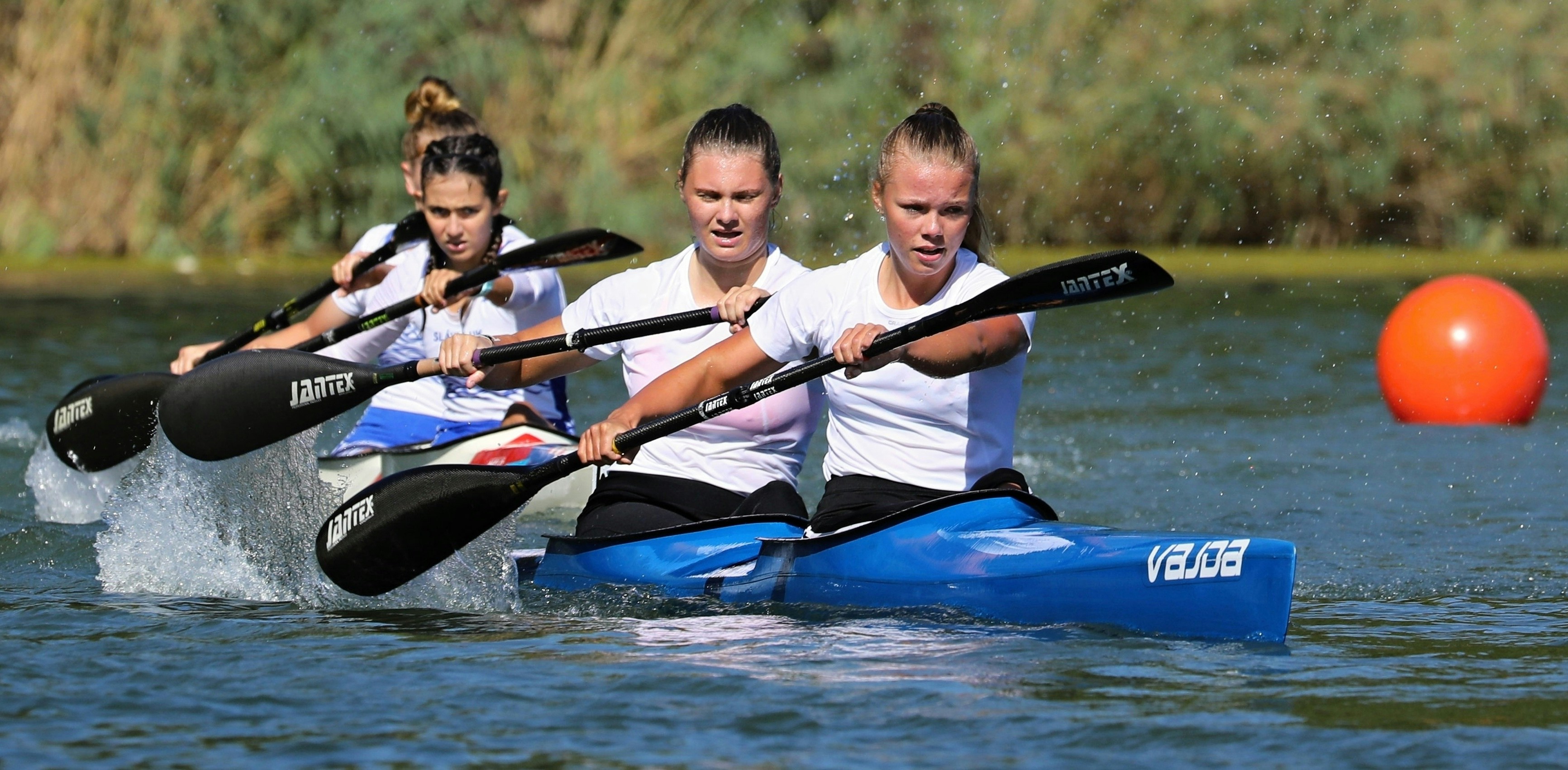 Three-Paddle Velocity: A Sunlit Kayak Sprint