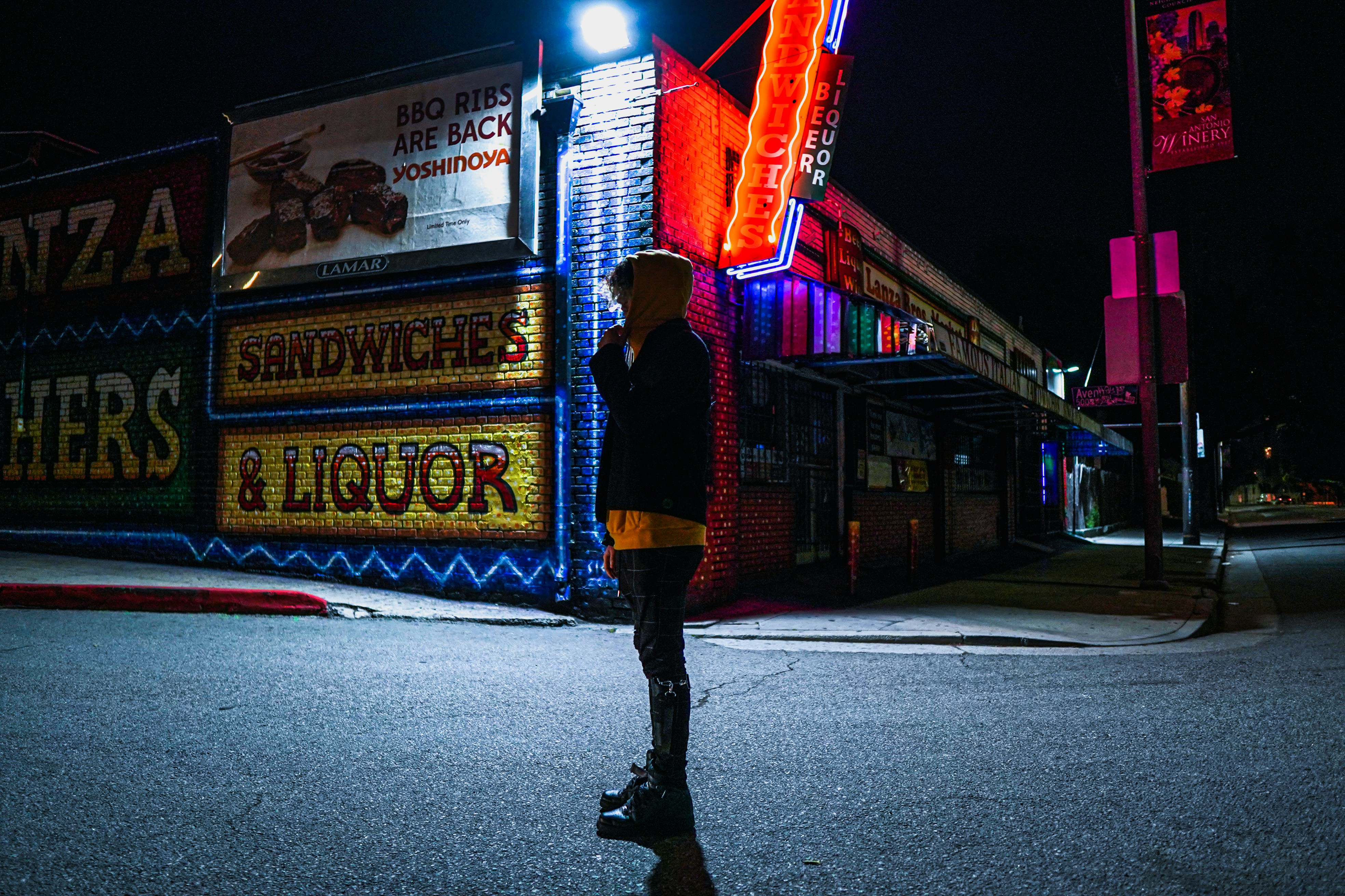 Neon Reflections on Urban Streets