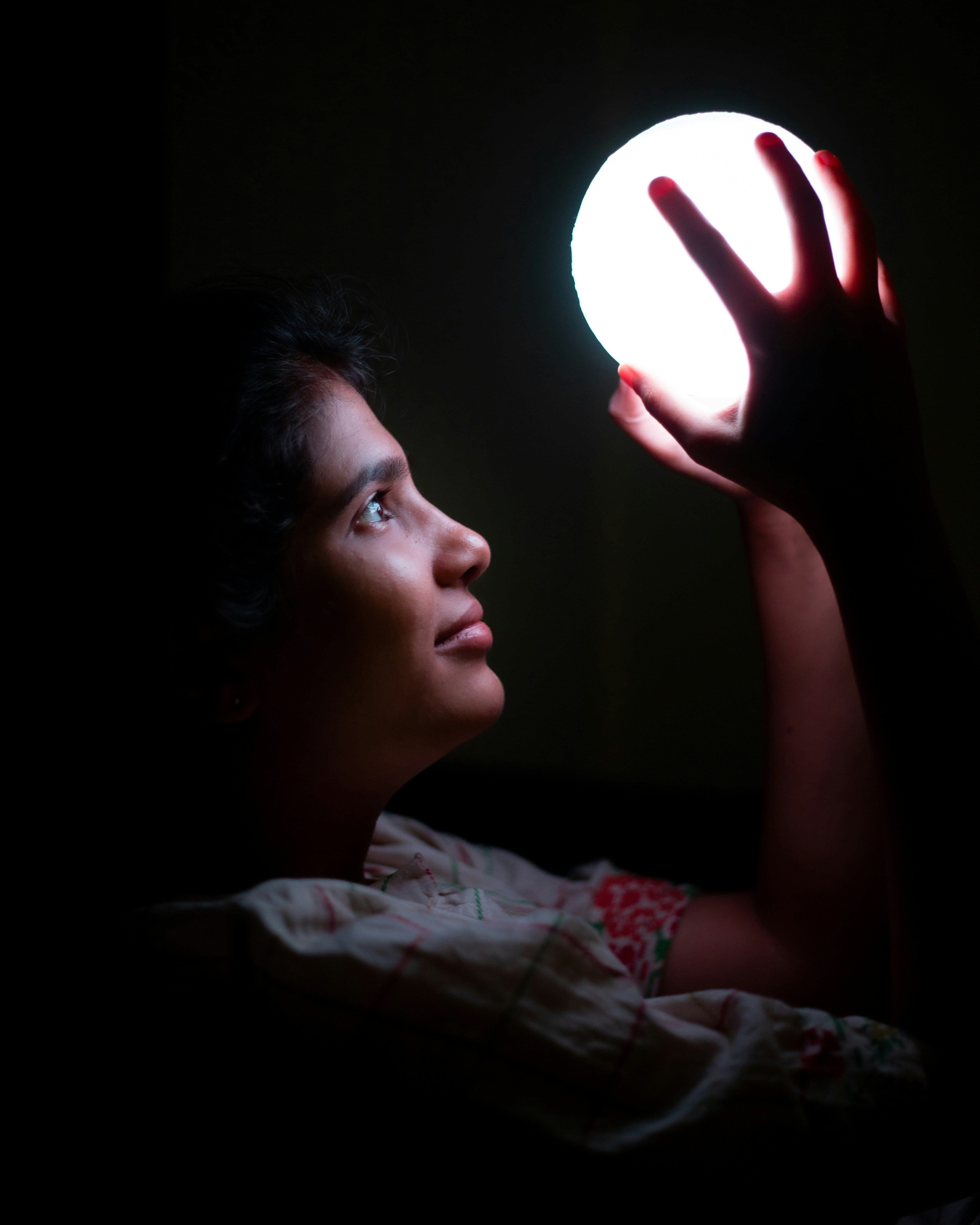 Glow in Her Gaze: A Portrait of Light and Quiet Wonder