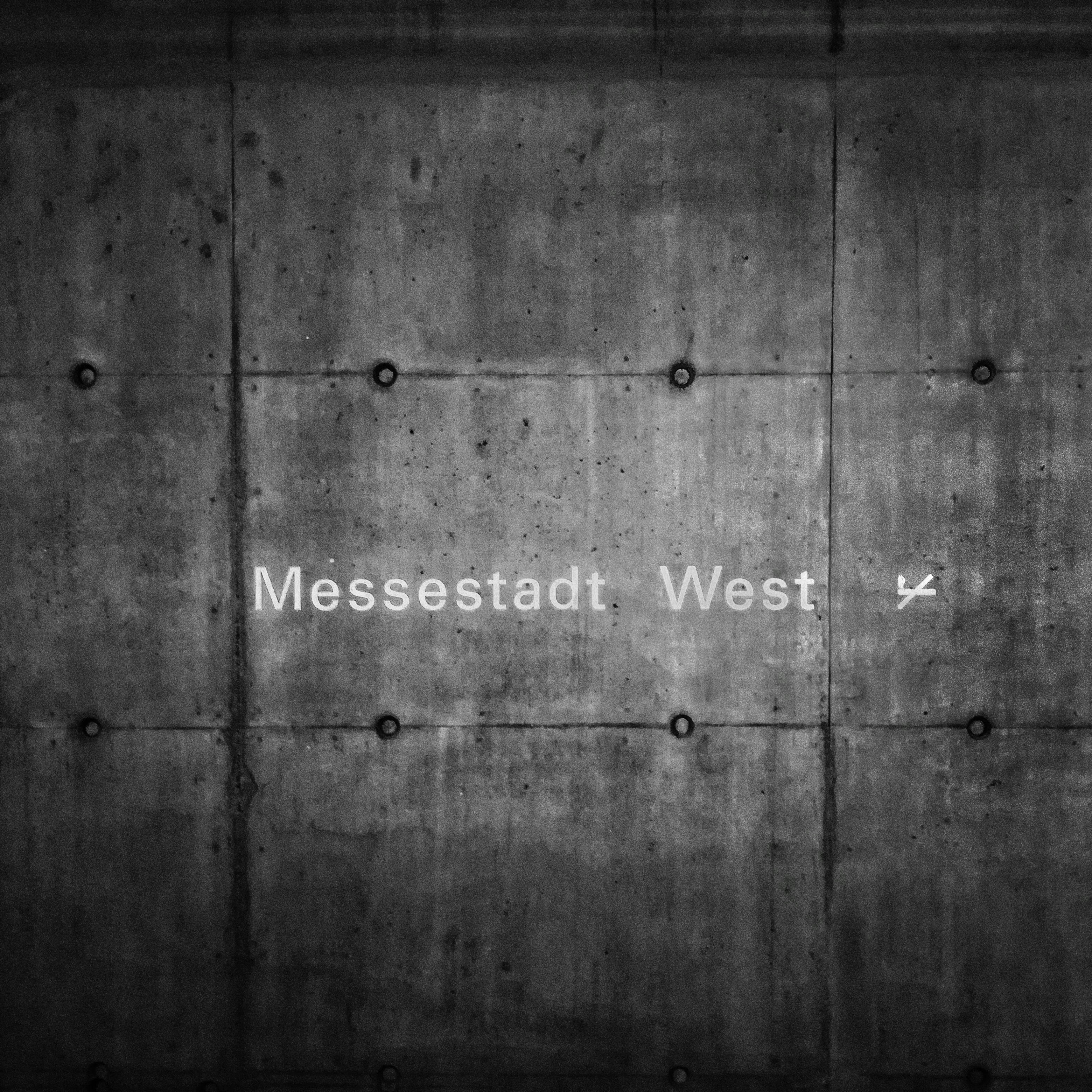 Messestadt West: Concrete Signals on a Riveted Wall