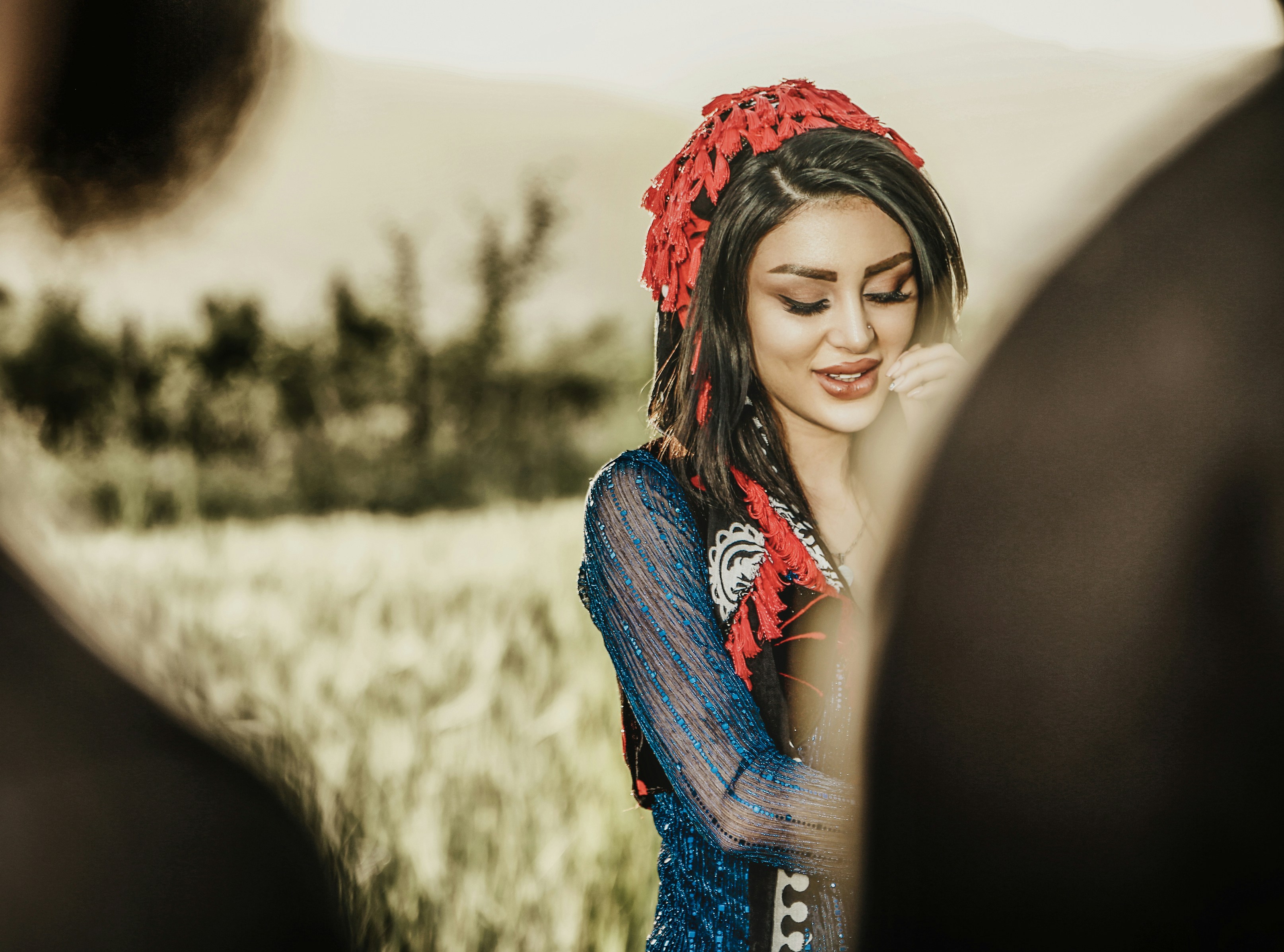 Field Portrait in Rustic Light: Blue Lace and a Red Floral Headscarf