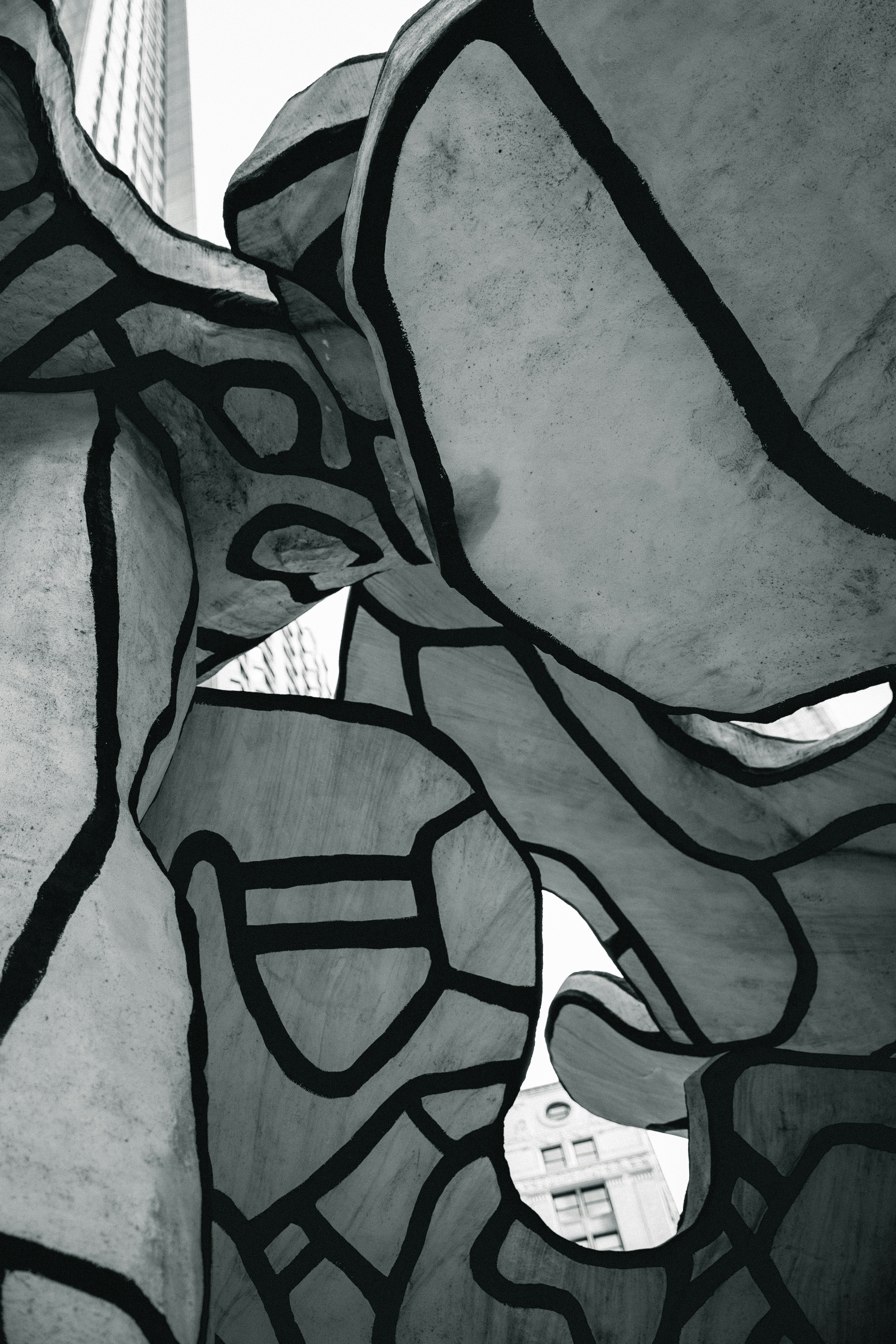 Interwoven Forms: A Dance of Shadows and Lines