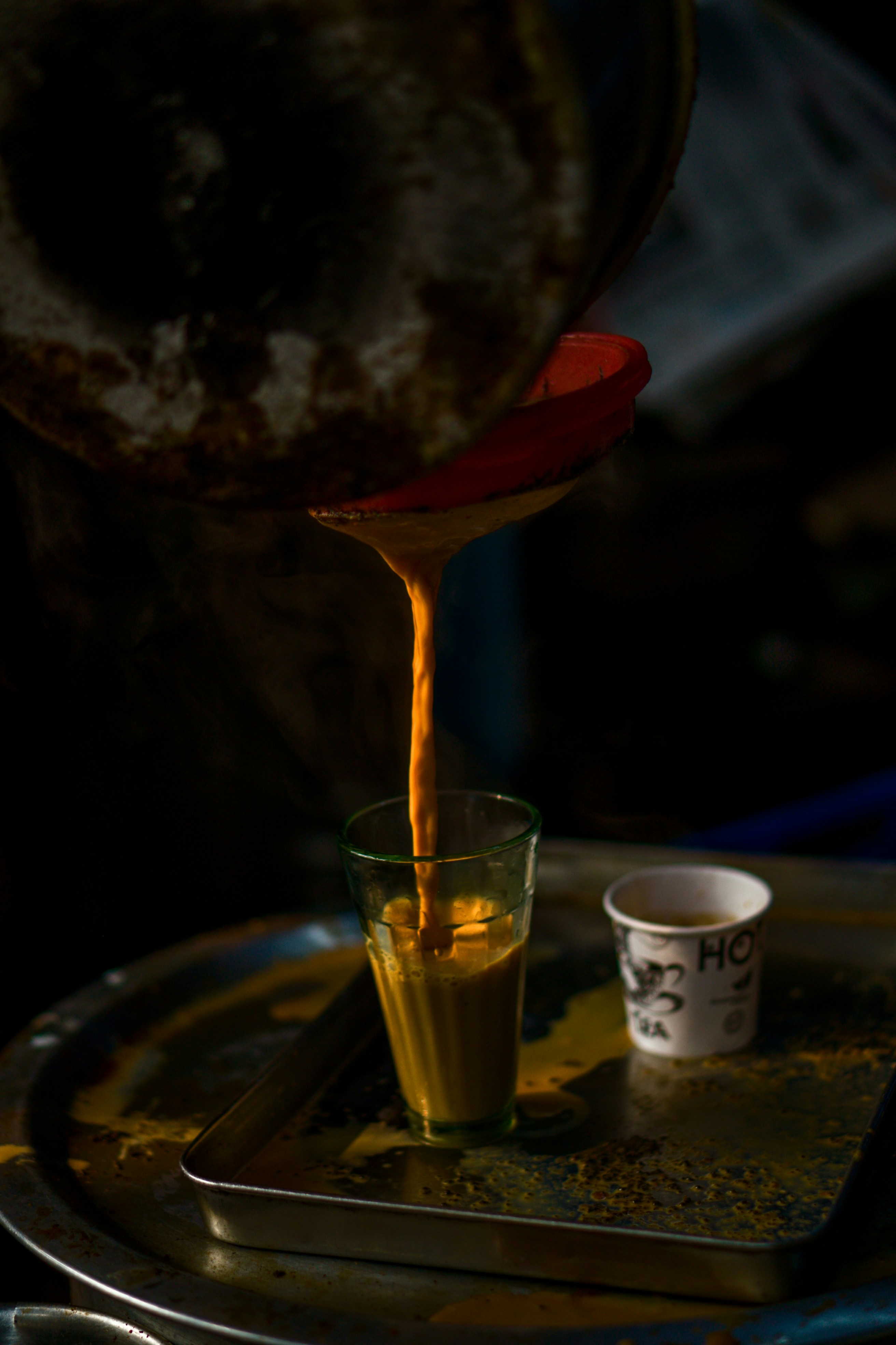 Amber Cascade in a Dim Kitchen