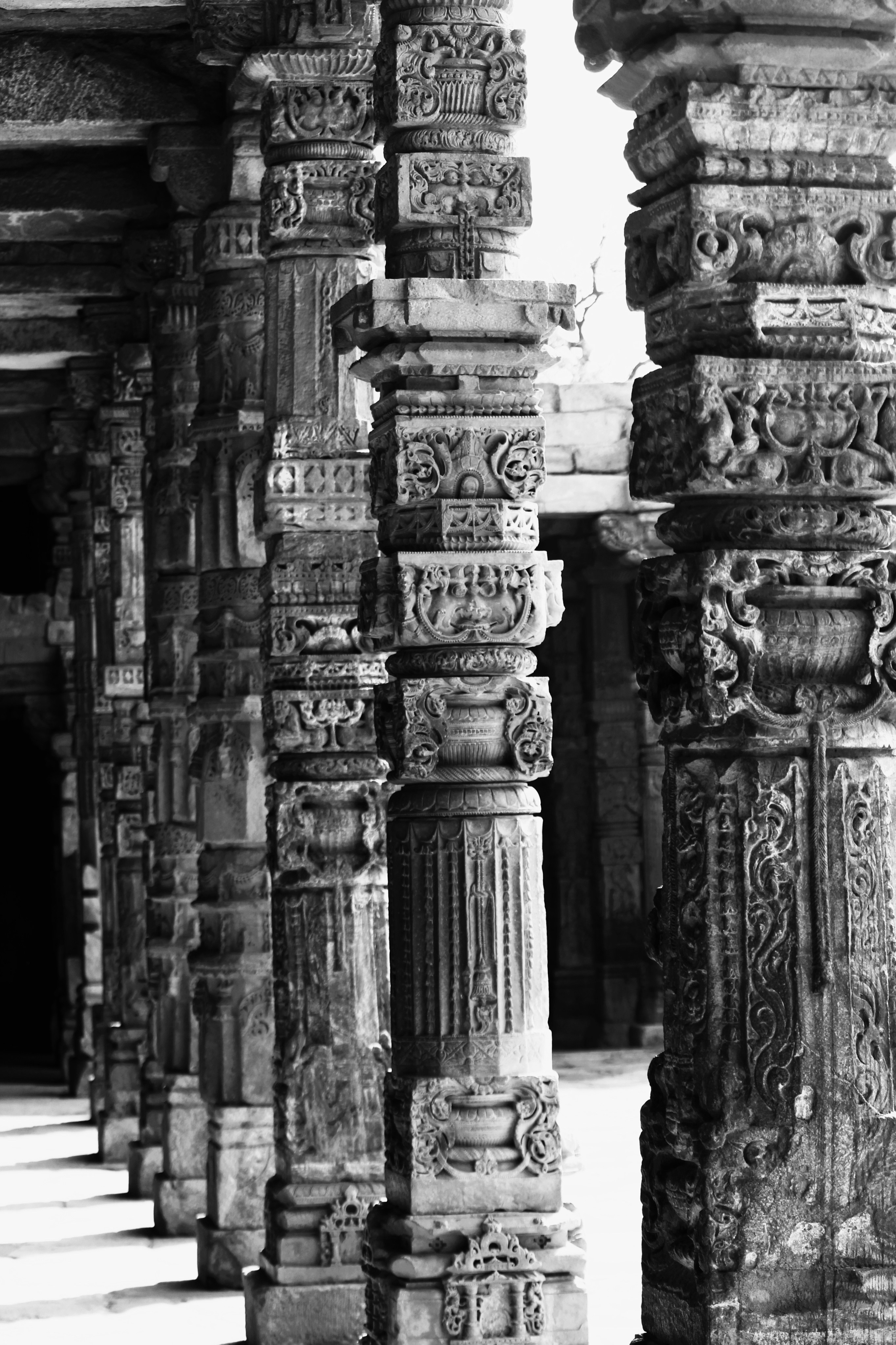 Grayscale photo of concrete pillar photo – Free Qutub minar complex ...