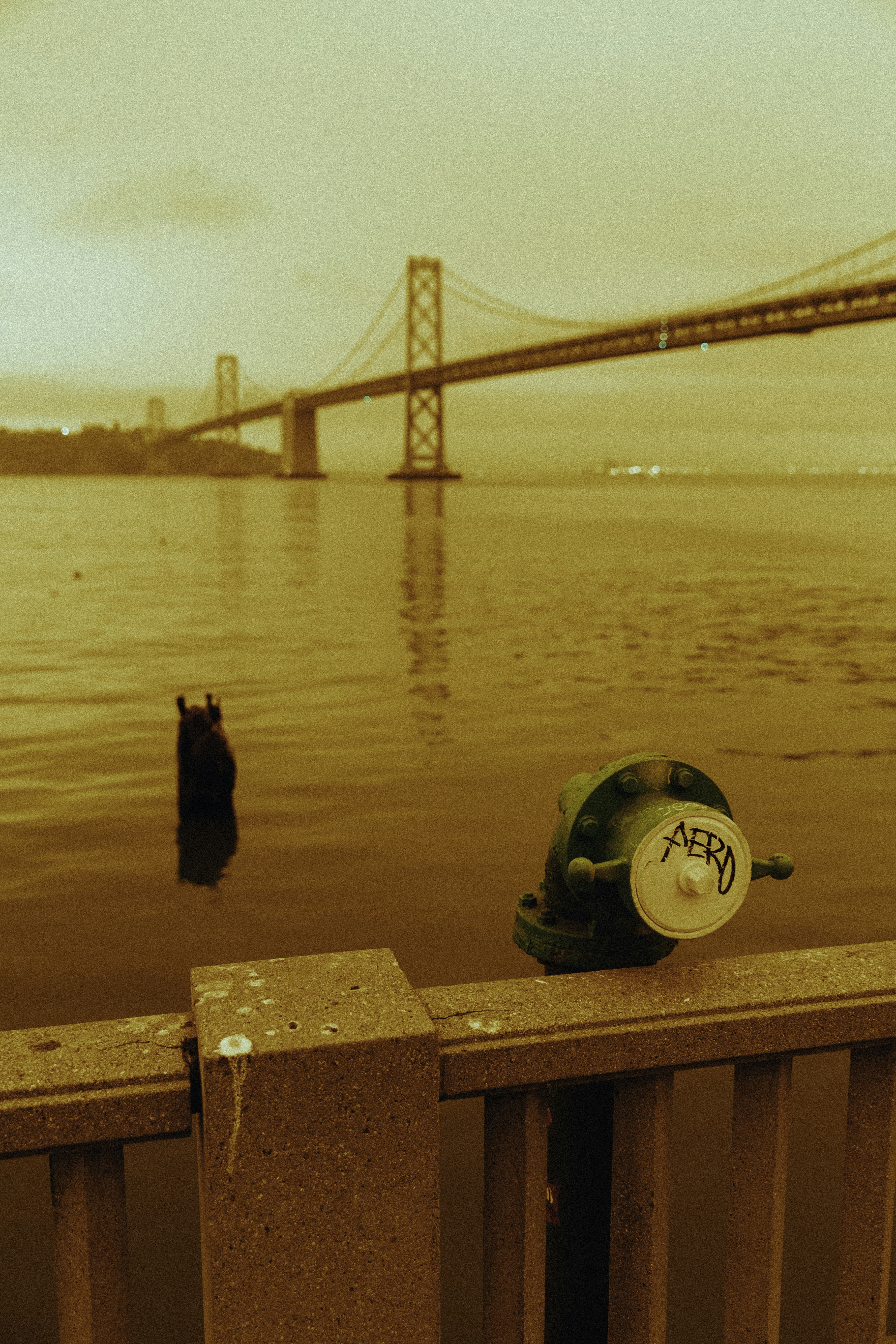 Golden Hour by the Pier: A Fire-Hued Quiet on the River