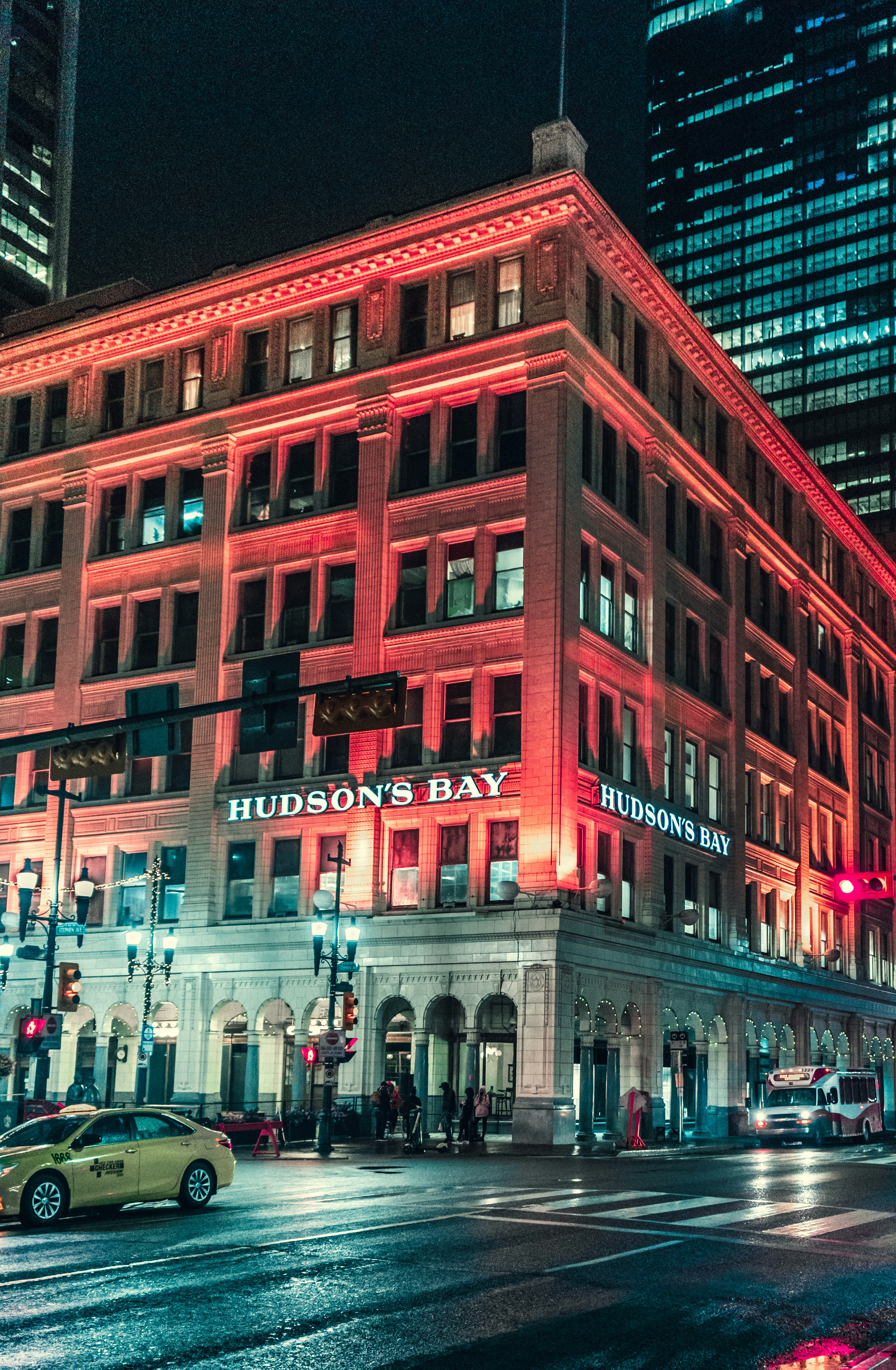 Crimson Neon on a Rain-Slick City Corner