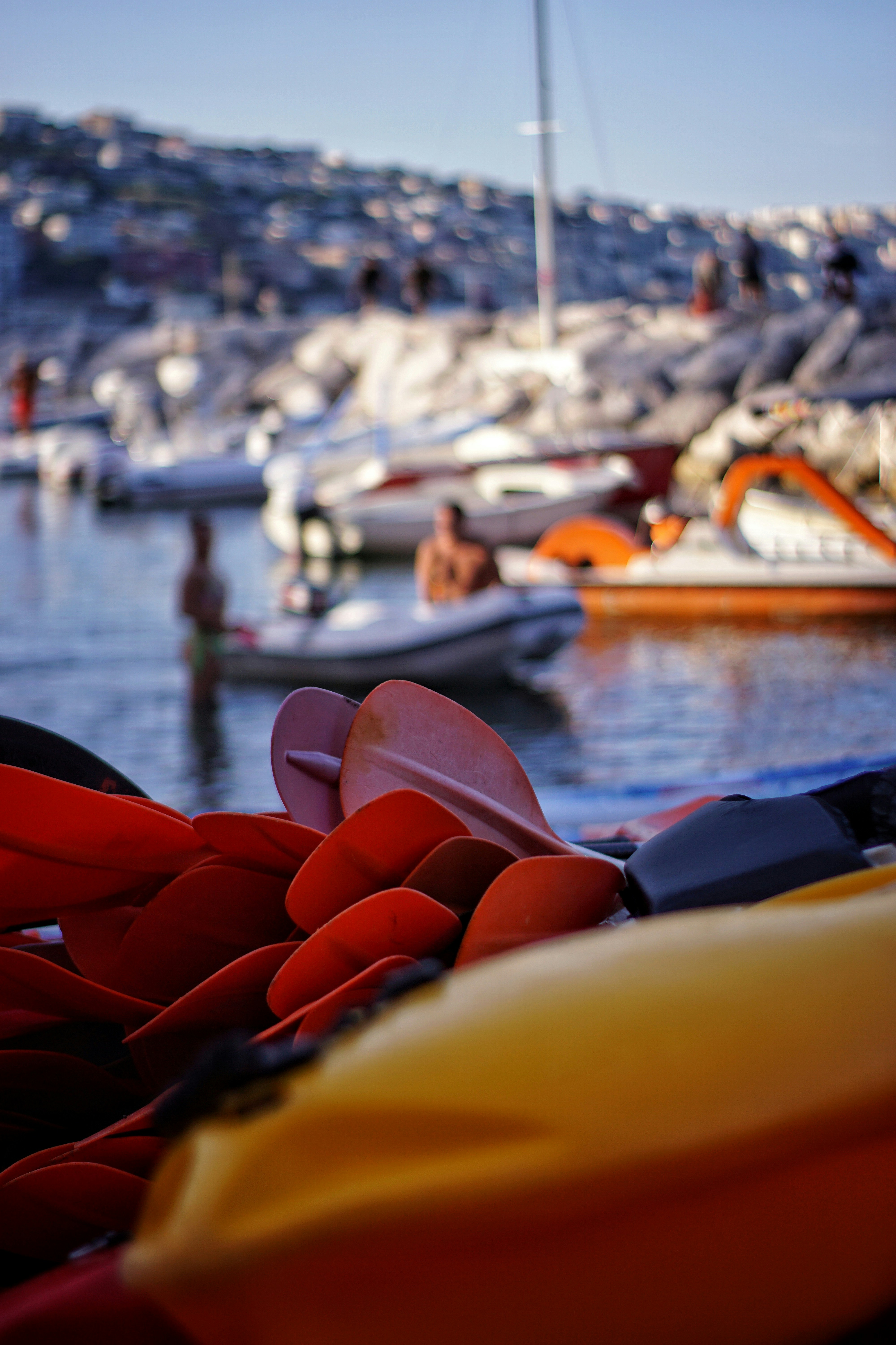 Red heart shaped balloons on yellow kayak on body of water during ...