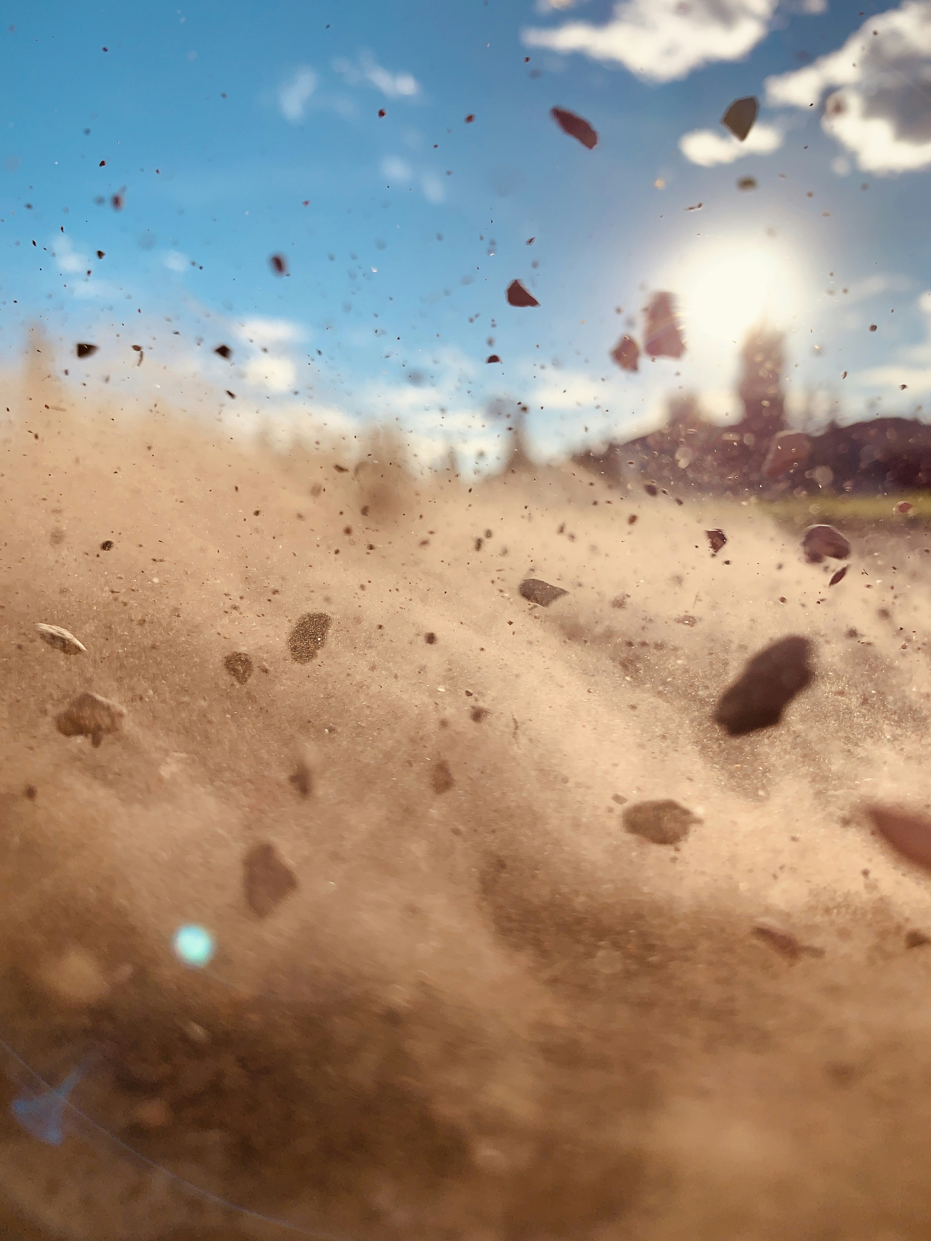 Dust Constellation: Particles Lift Off in Sunlit Field