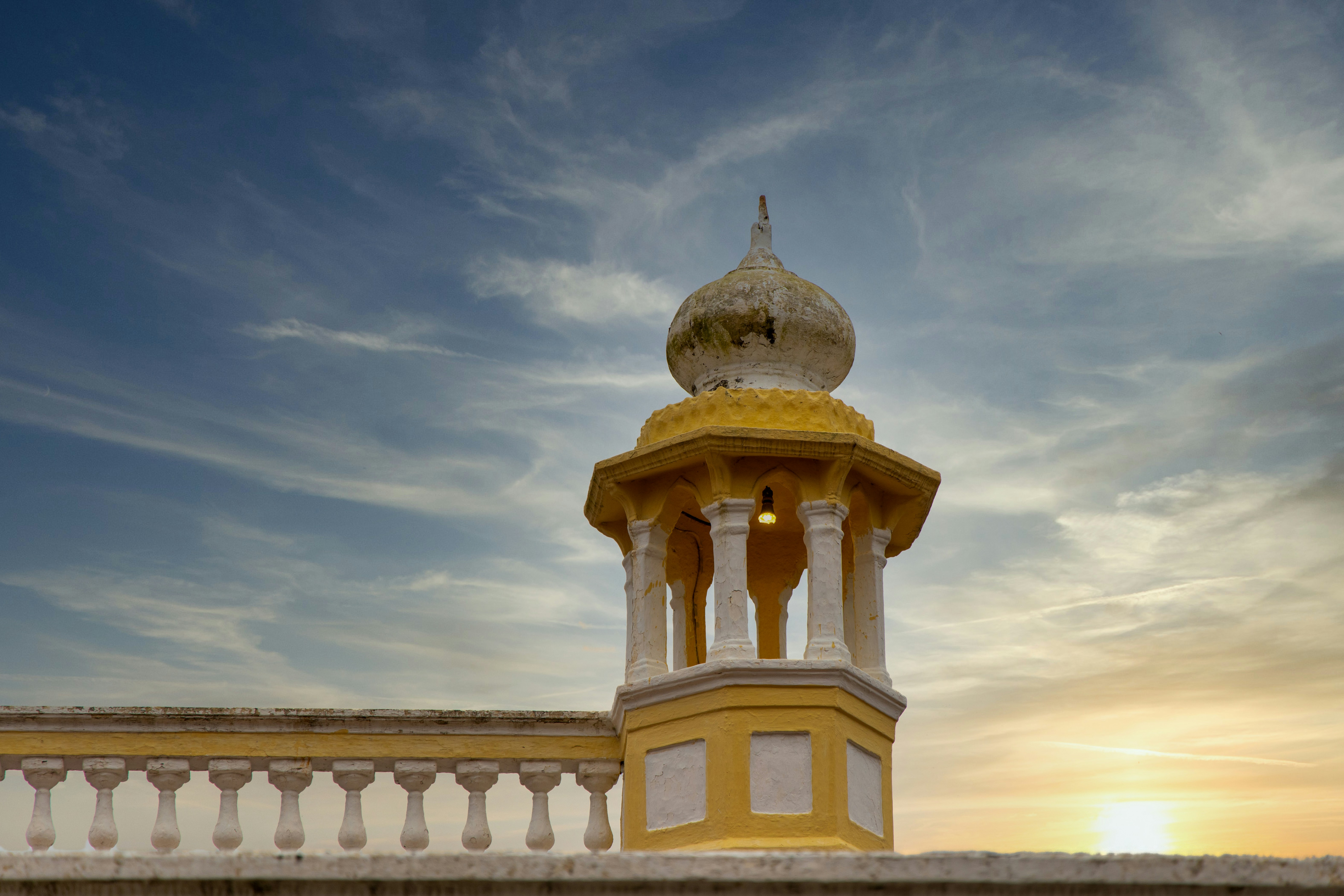 Sunset Turret on a Yellow Terrace: Quiet Geometry at Dusk