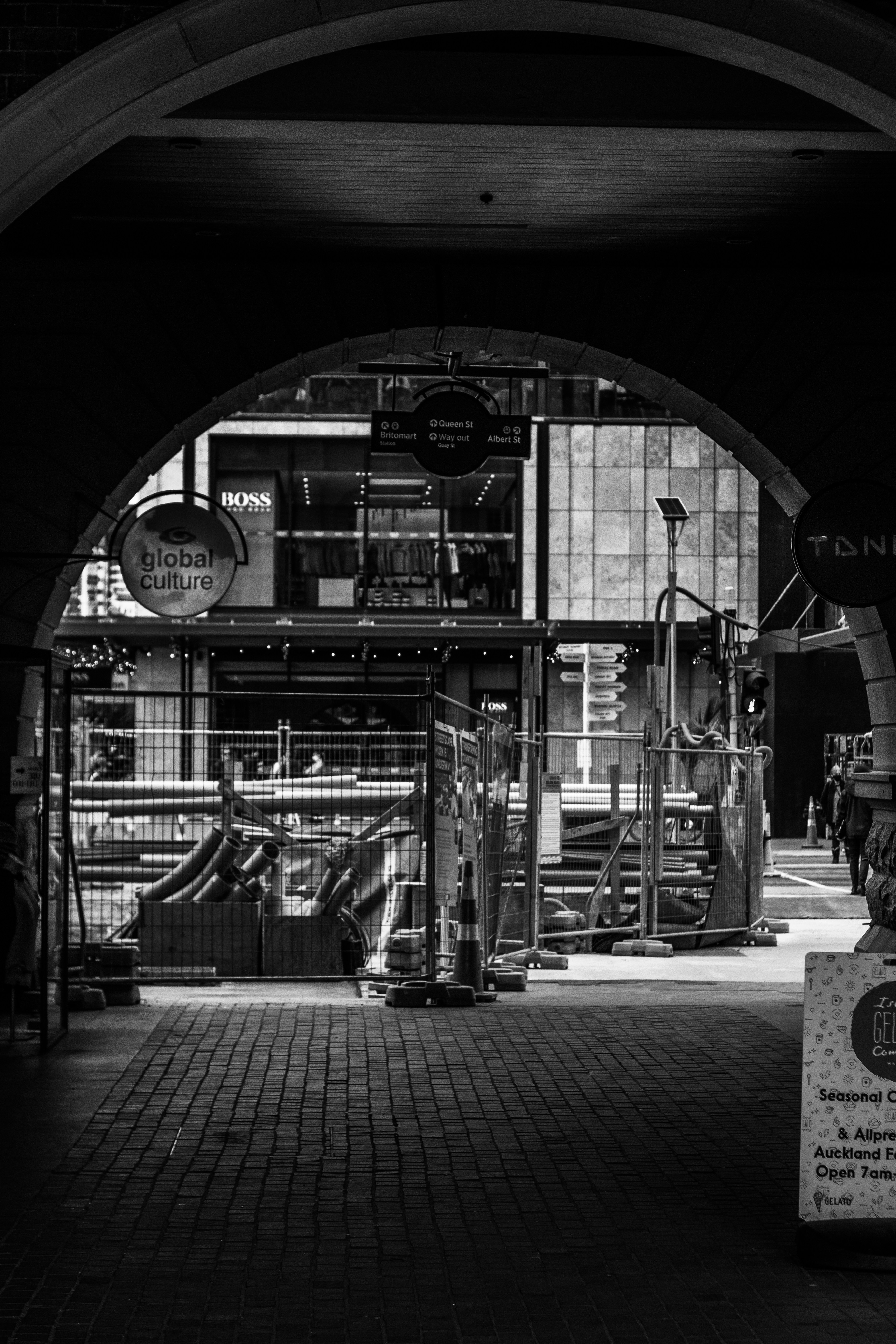 Light at the Arch: An Urban Portrait through a Dark Archway