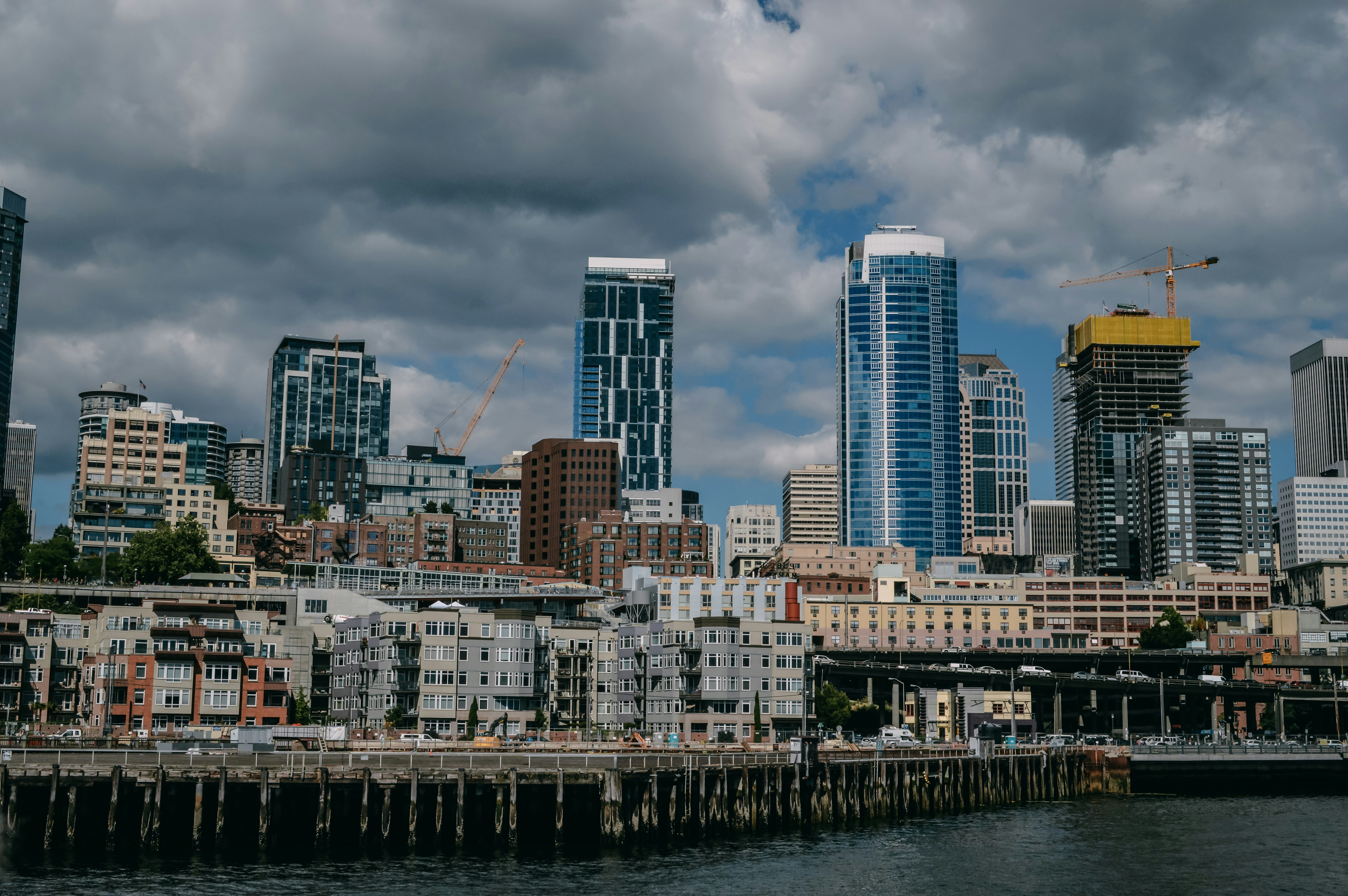 City skyline under gray cloudy sky during daytime photo – Free Seattle ...