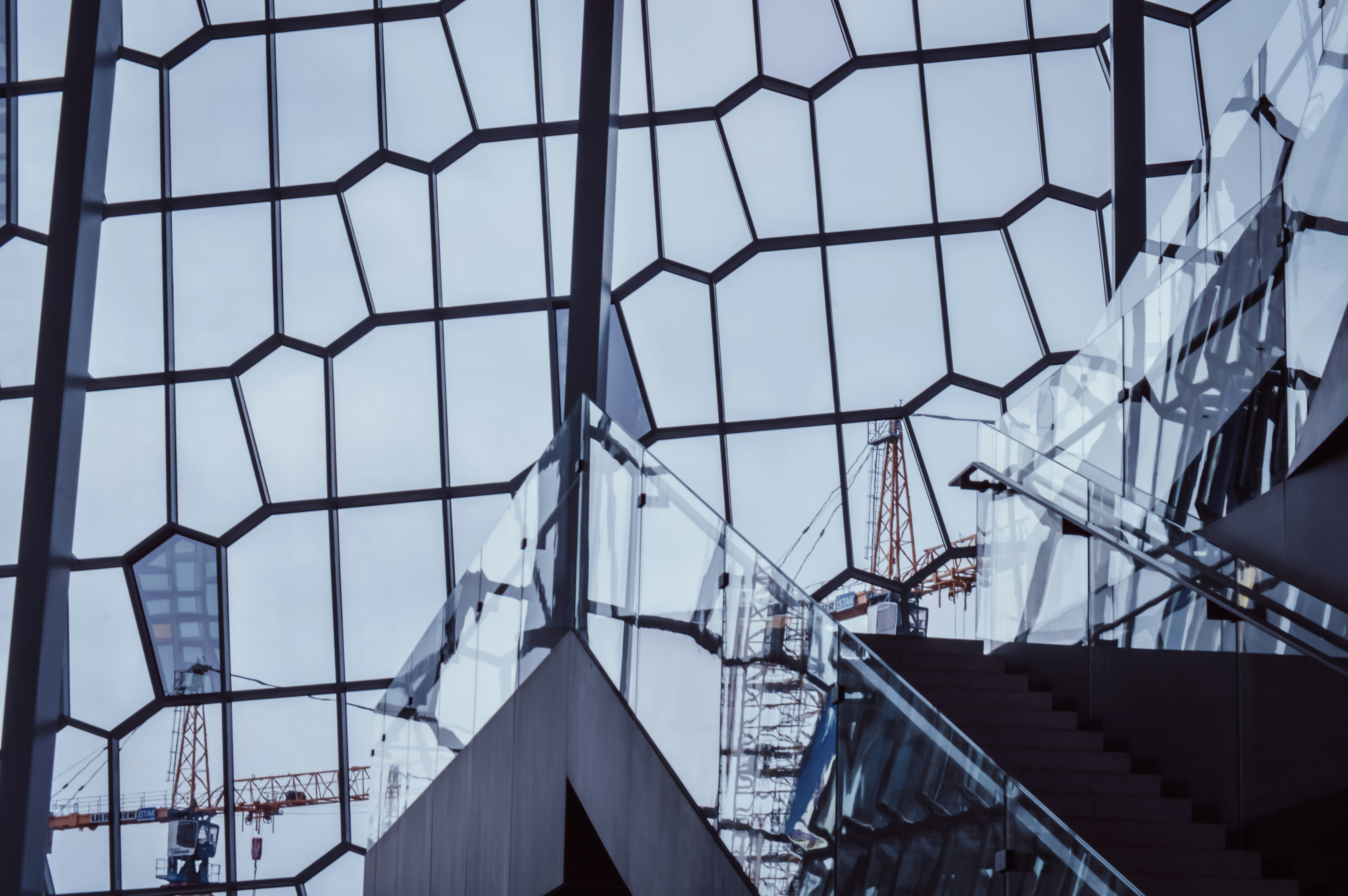 Hexa-Glass Geometry: Inside the Atrium Staircase