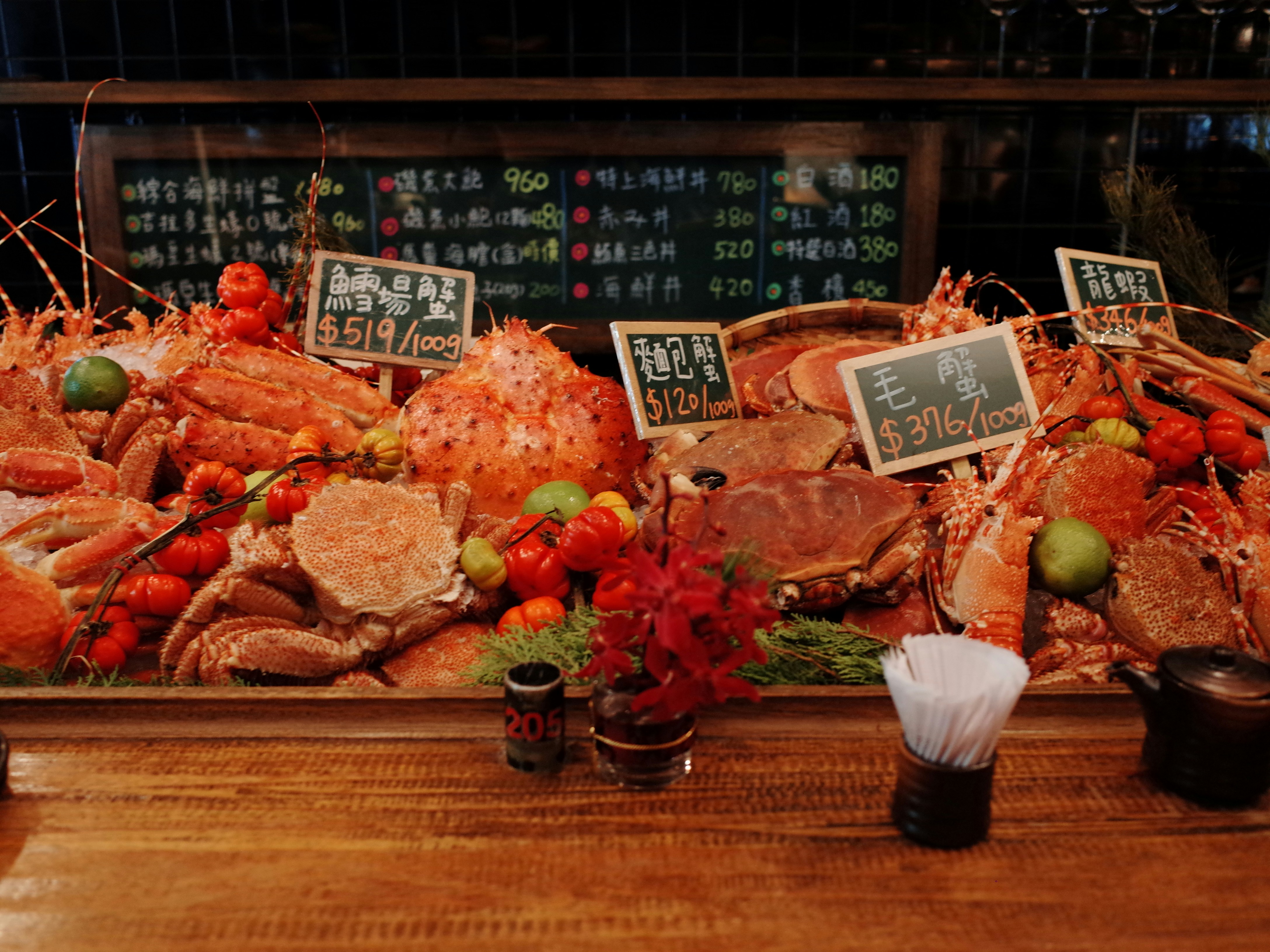 Crab Market Mosaic: A Walk Through Fresh Shells and Signs