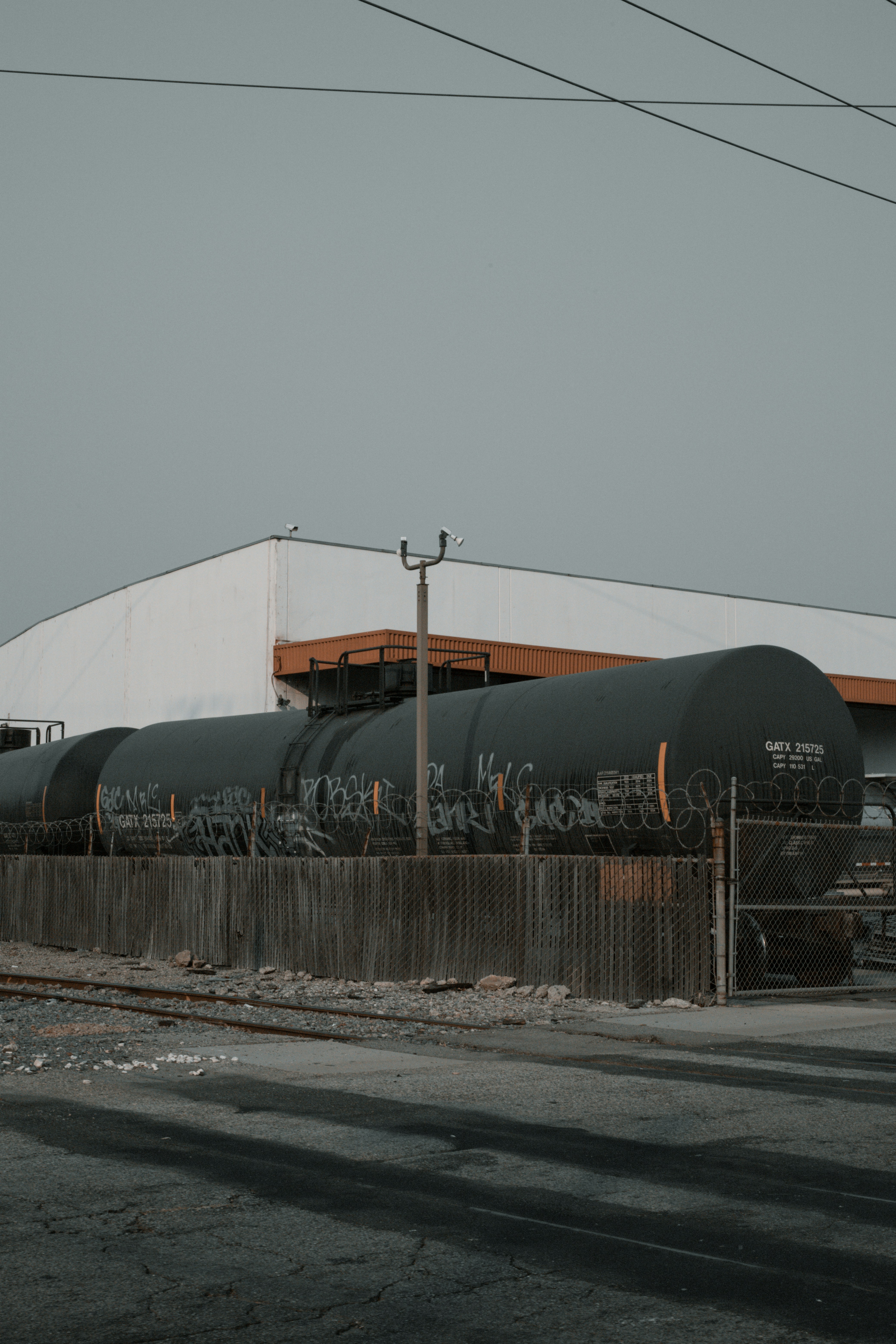 black and white train on rail tracks during daytime