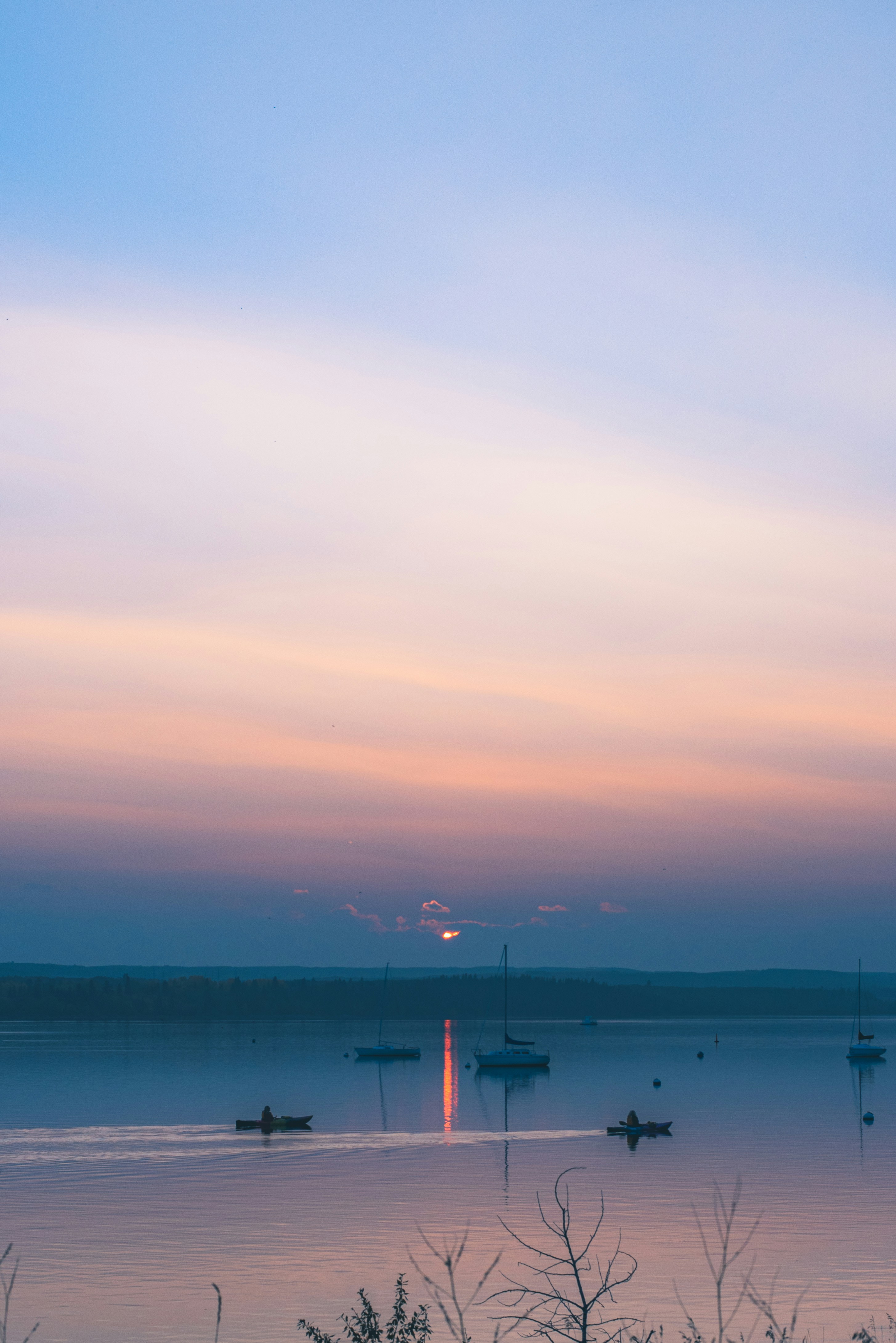 Dusk on the Harbor: Boats Silhouetted by a Silk Sky
