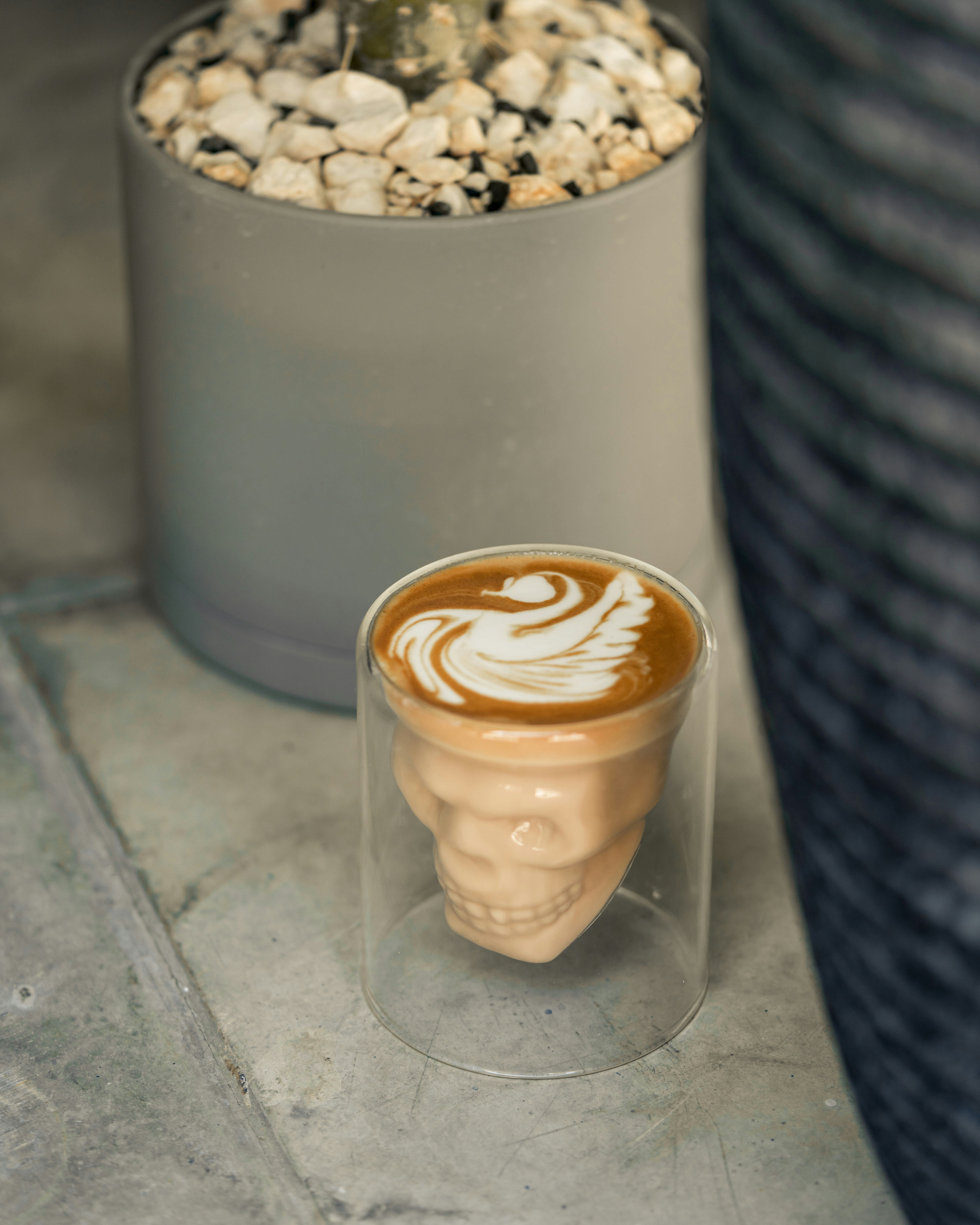 clear glass cup with brown liquid