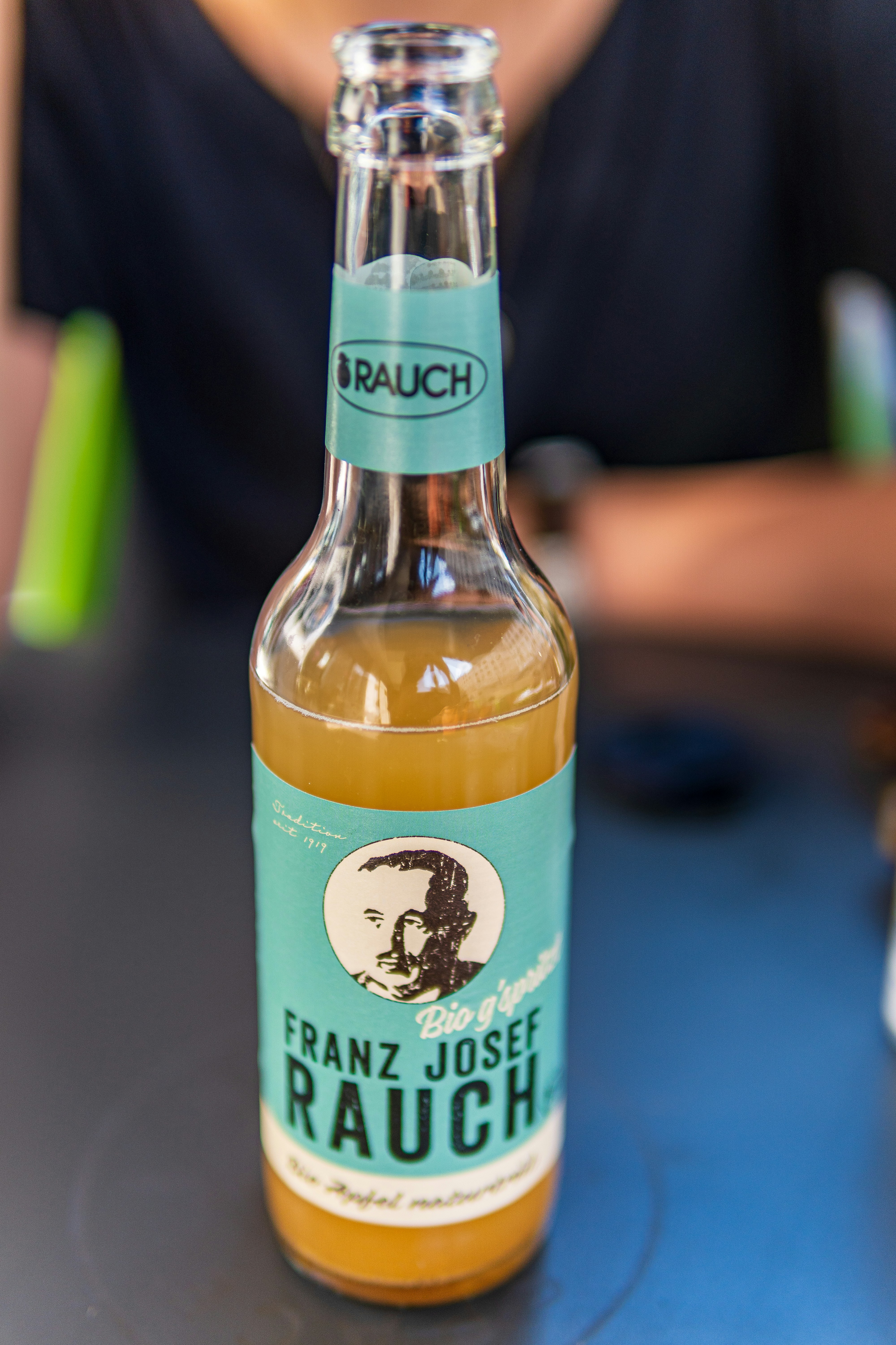 white and blue labeled bottle