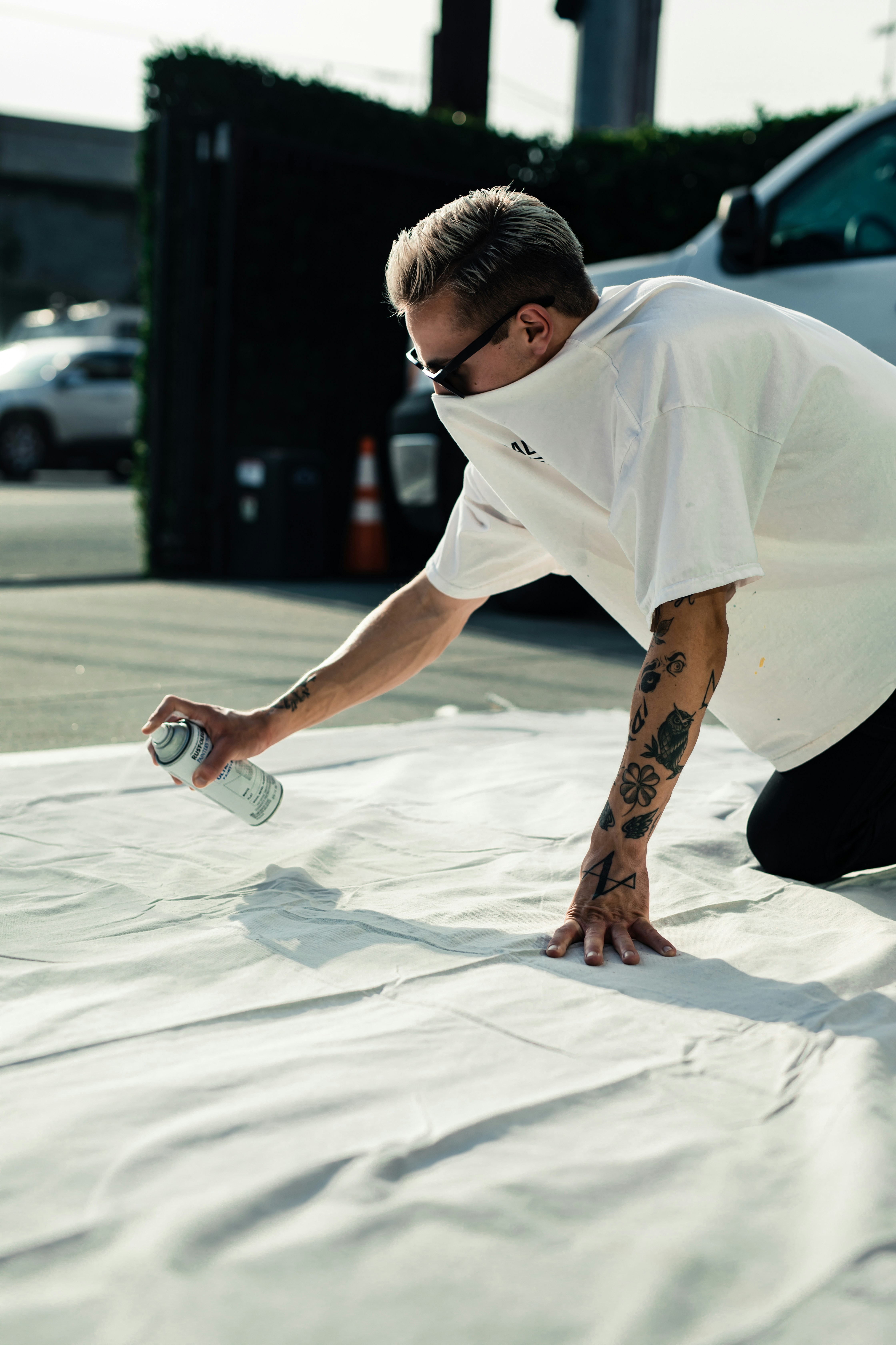 Spray and Focus: A Portrait of Motion on White Canvas