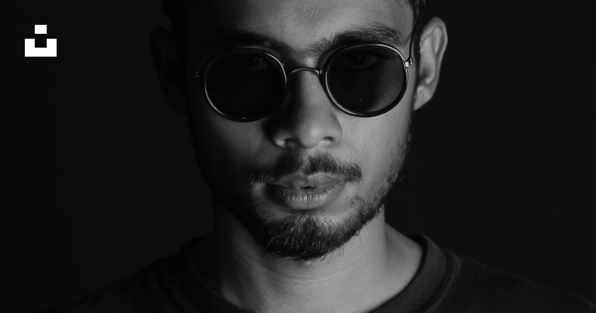 Man In Black Crew Neck Shirt Wearing Black Sunglasses Photo Free