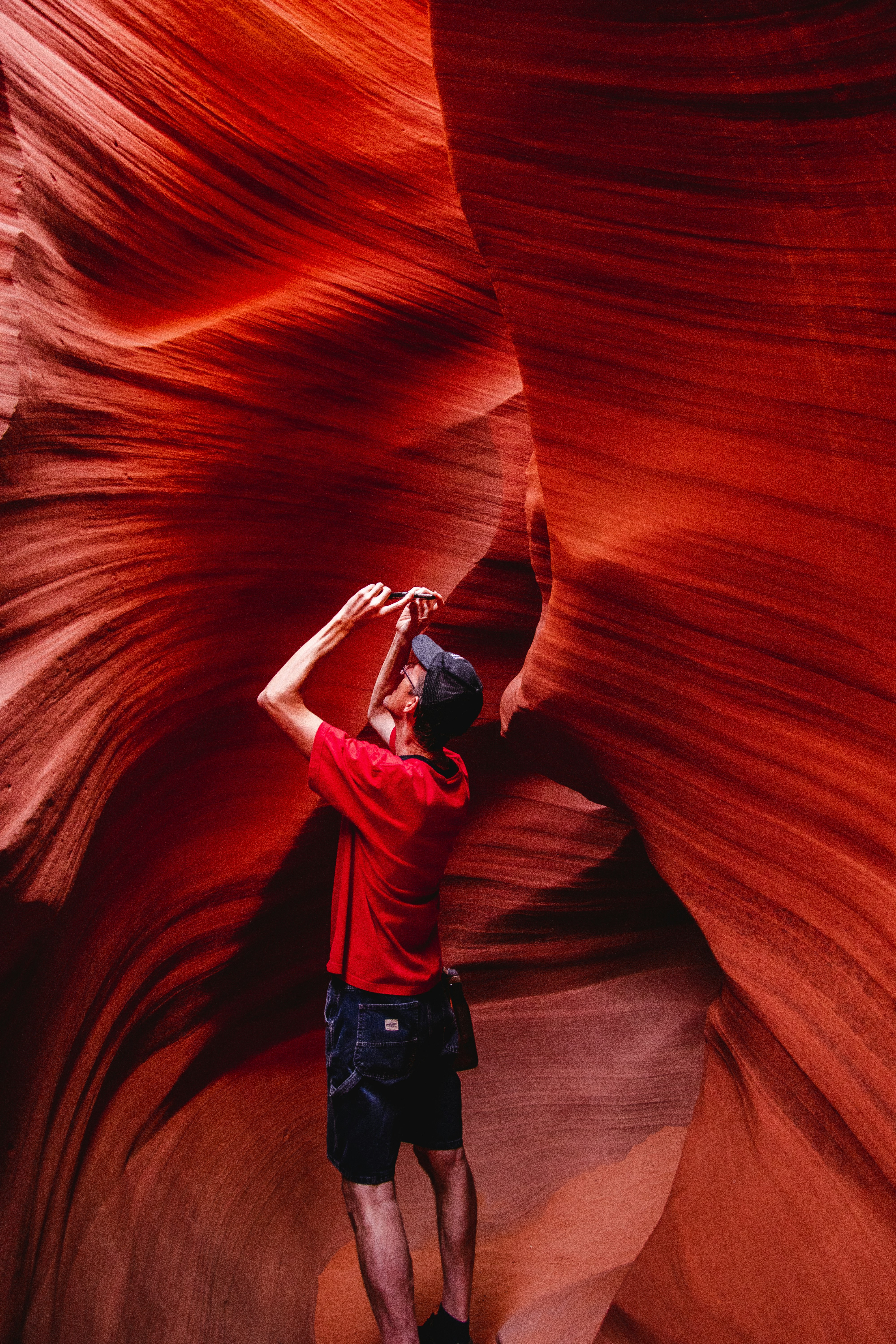 Red Canyon Explorer Reaches for the Curve of Light