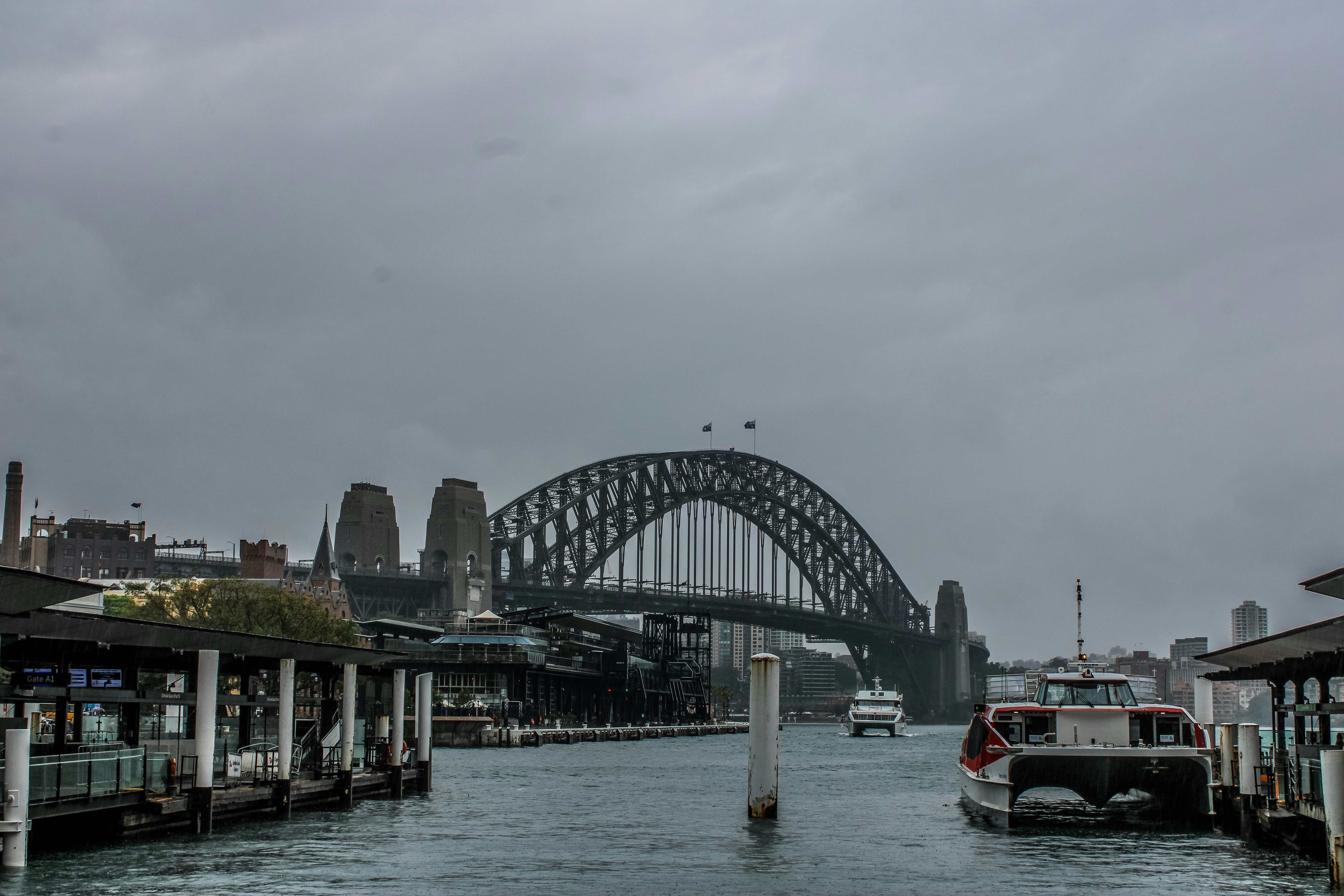 Sydney's Steel Arch Under a Cloudy Sky Over Darling Harbour