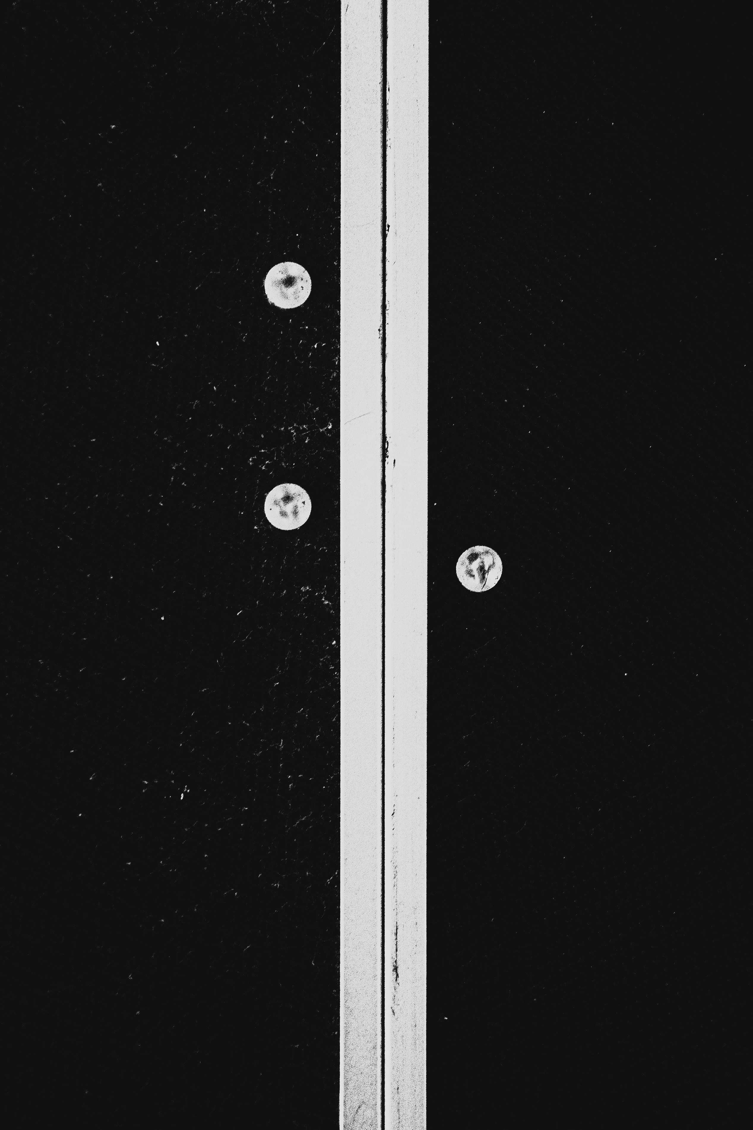 The Quiet Divider: A Minimalist Black-and-White Seam with Screws