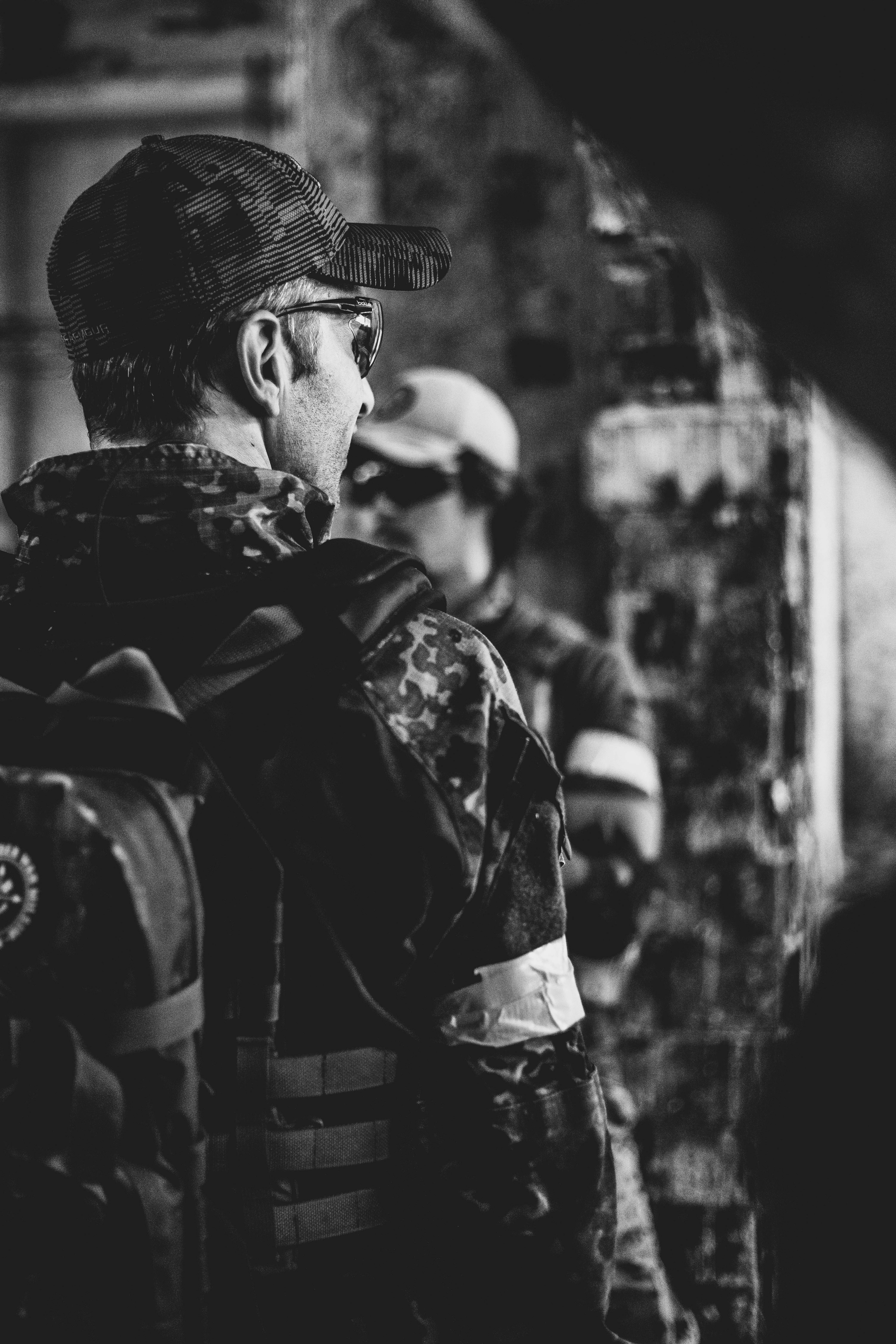 Monochrome Gaze in Camouflage: A Soldier in Profile