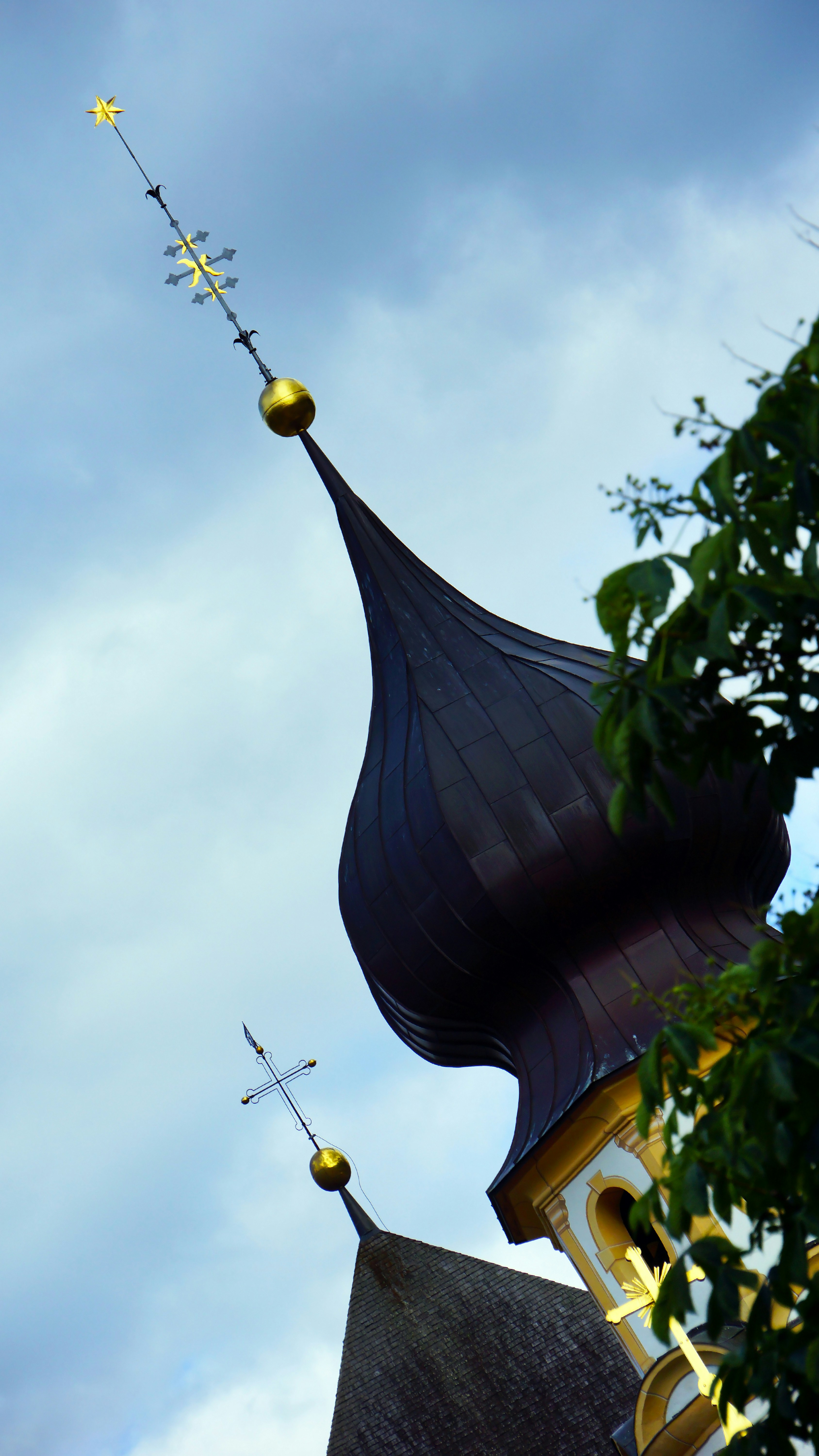 black and yellow umbrella under white clouds during daytime