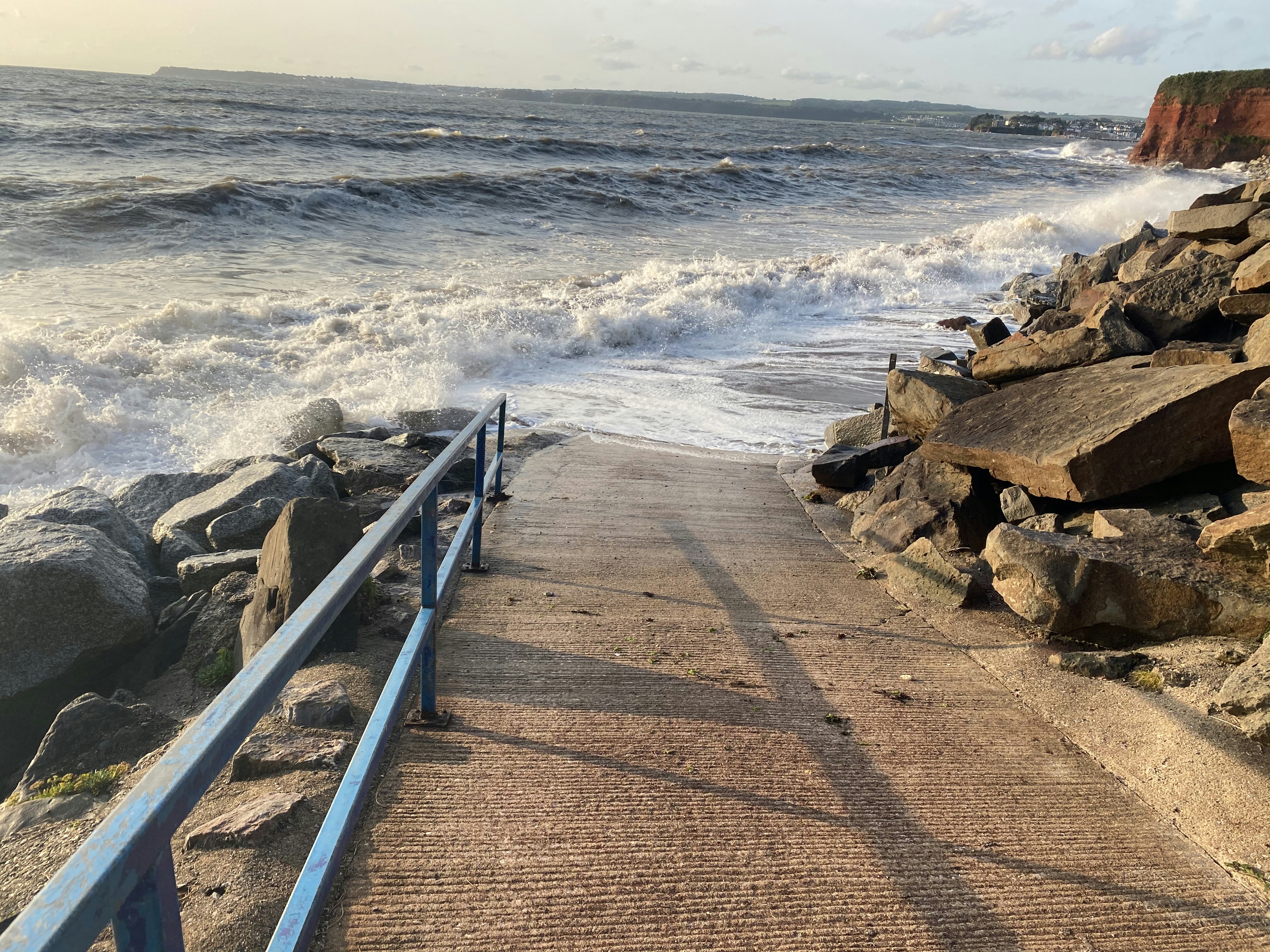 Rough Seas | brown wooden dock on sea during daytime