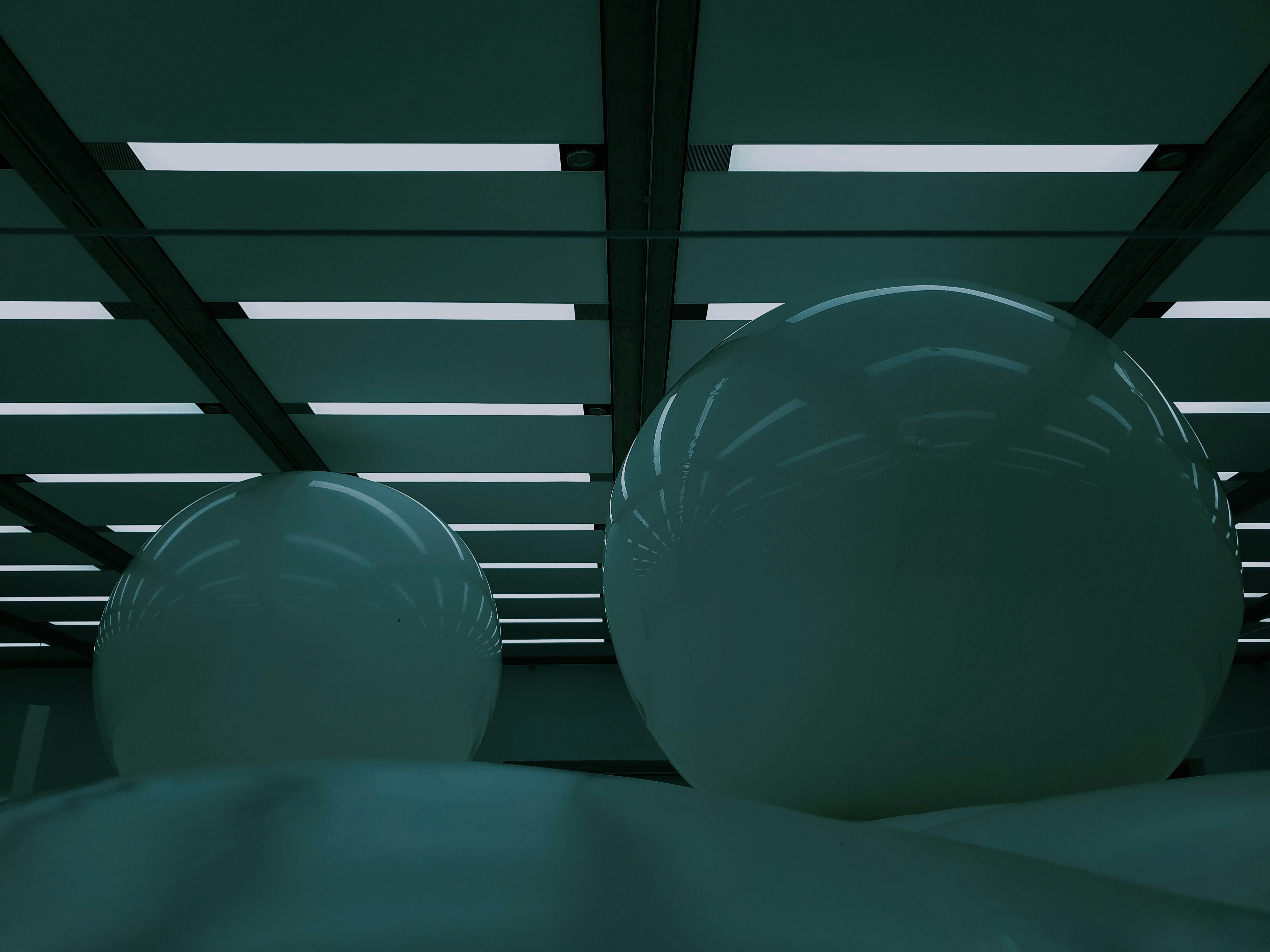 Teal Orbs Beneath a Lattice of Light