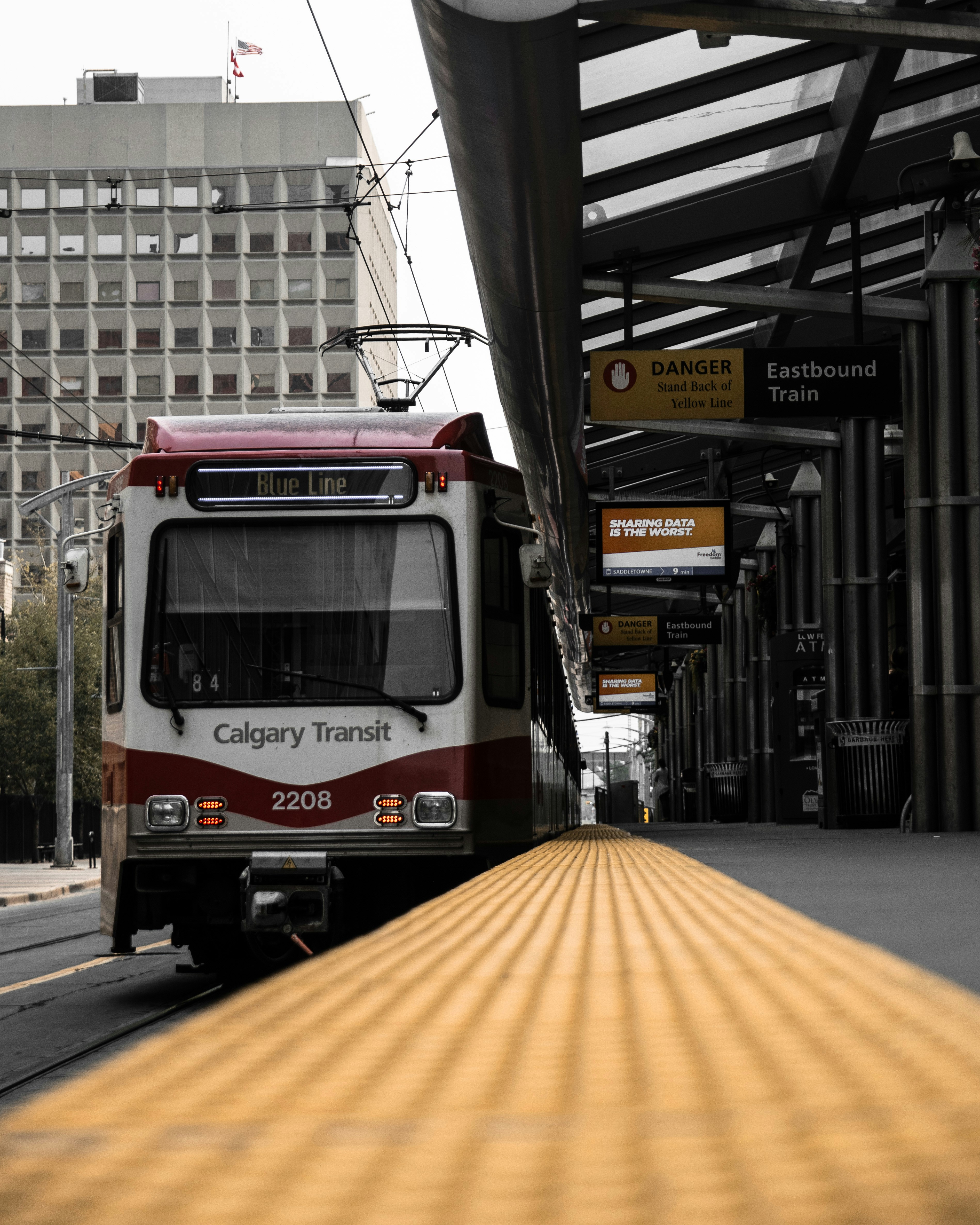 Calgary Transit at Platform Edge: A Red Line Stands Ready