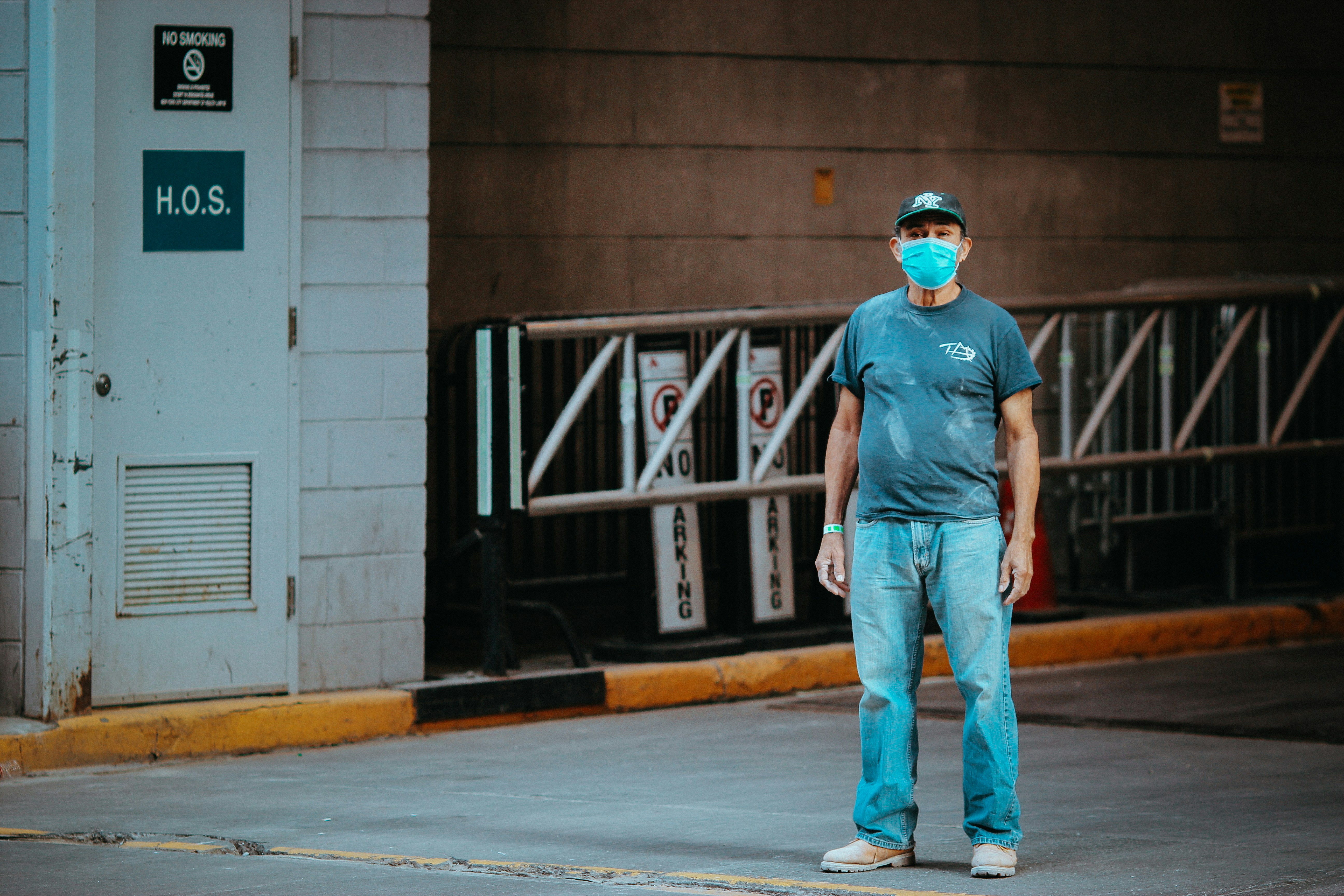 Masked attendant at the loading dock