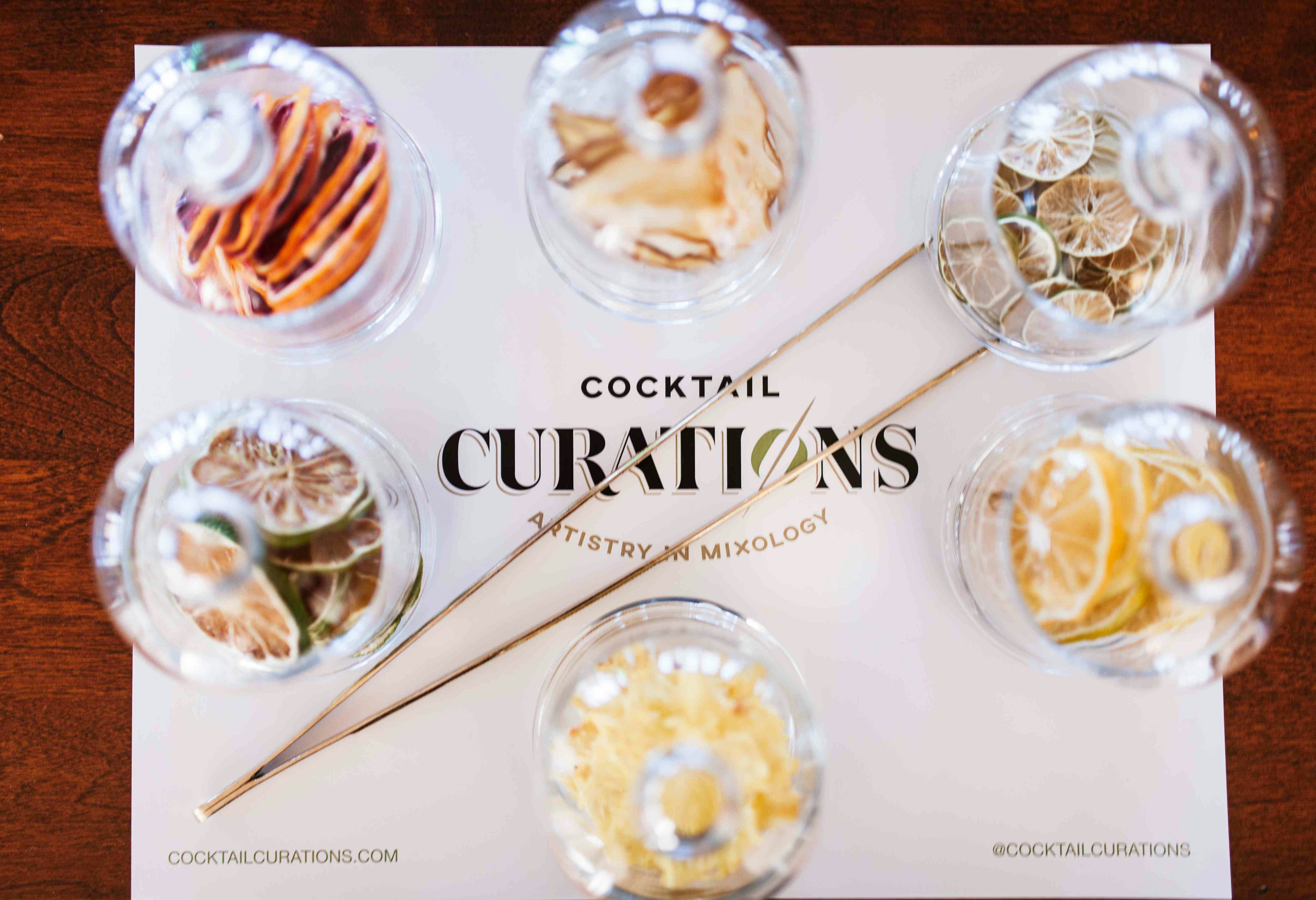 Overhead Glimmer: a symmetrical array of cocktail glasses