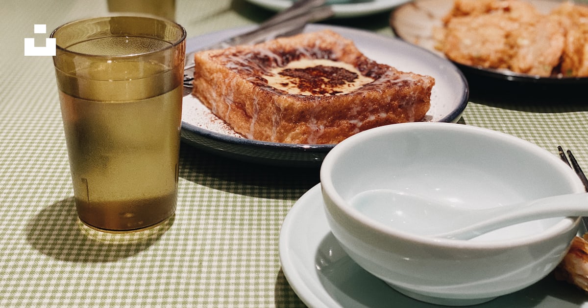 Clear Drinking Glass Beside White Ceramic Plate With Food Photo Free
