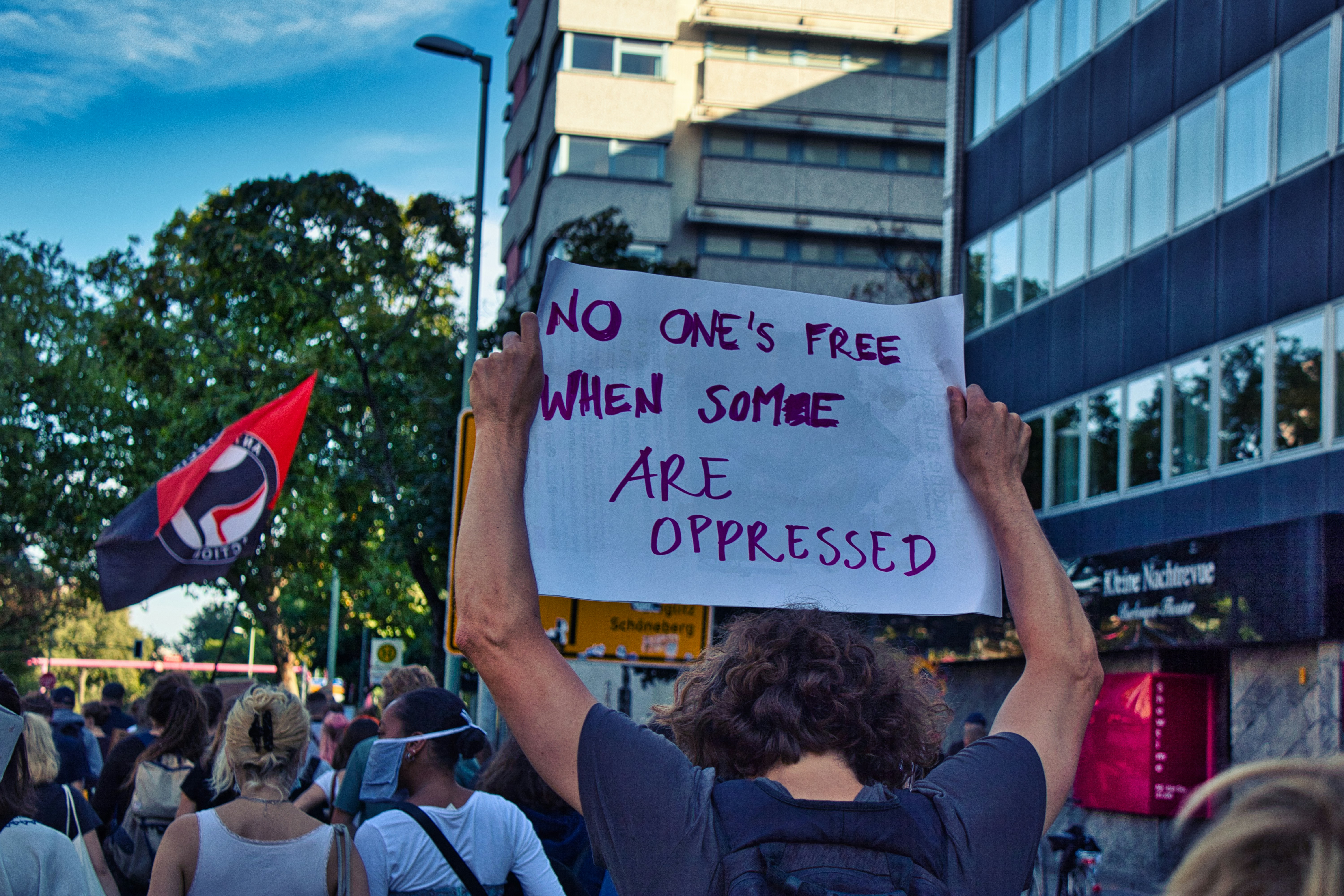 Hands Up Protest Sign in the City: A Collective Moment