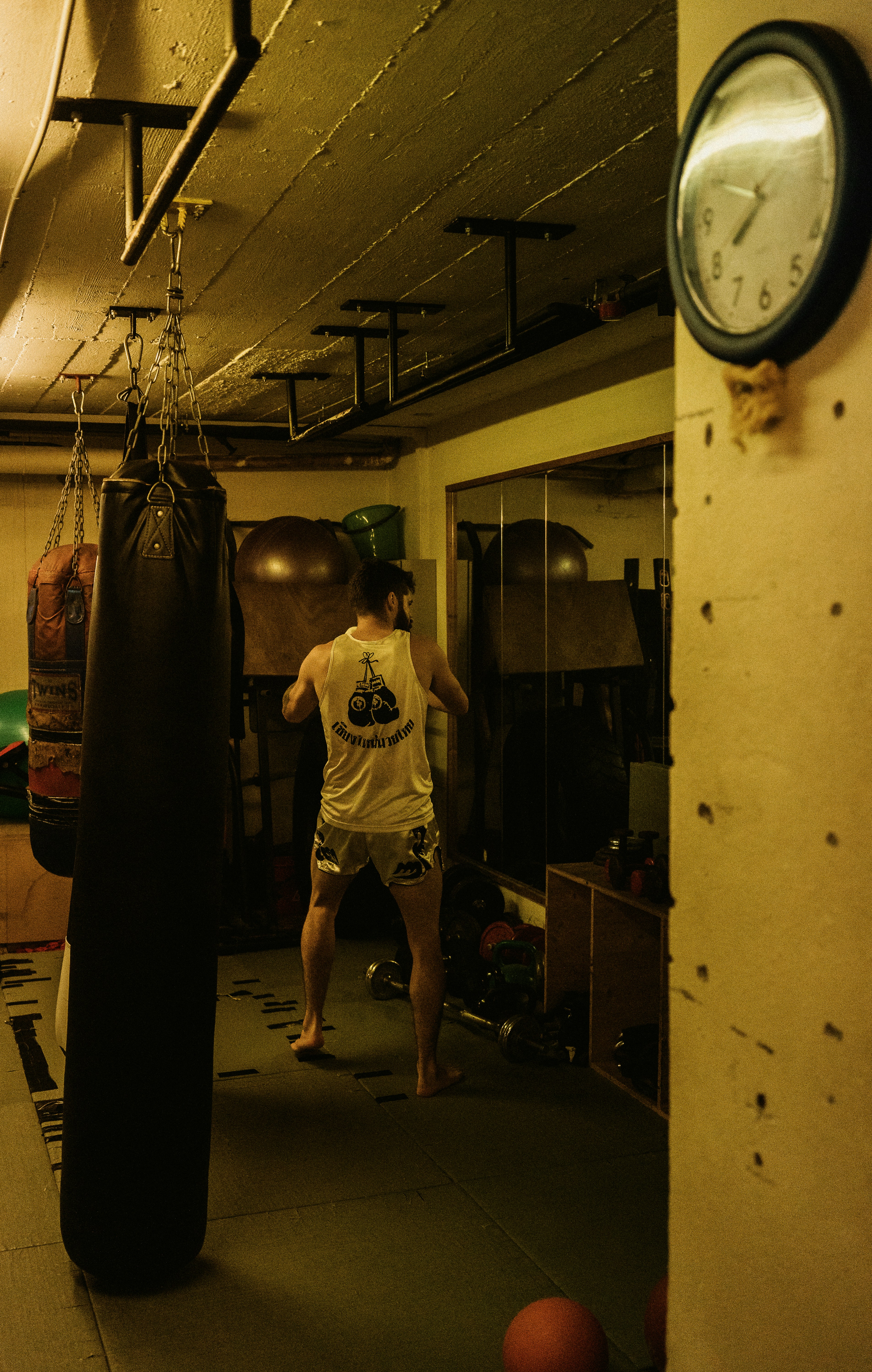 Back to the Ring: A Quiet Moment in a Dim Boxing Gym
