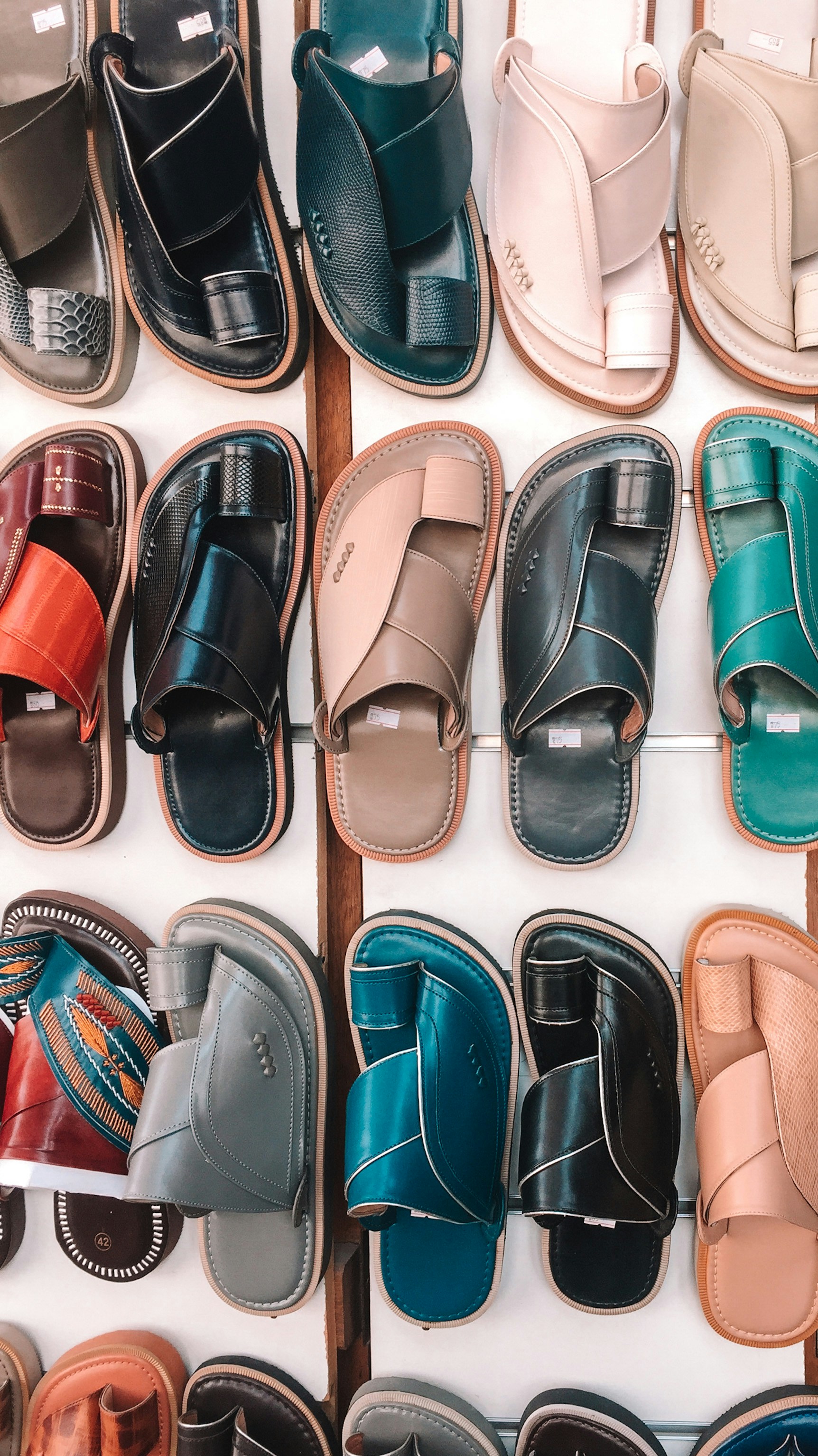 Color-Block Mosaic: Leather Slides Line the Boutique Display