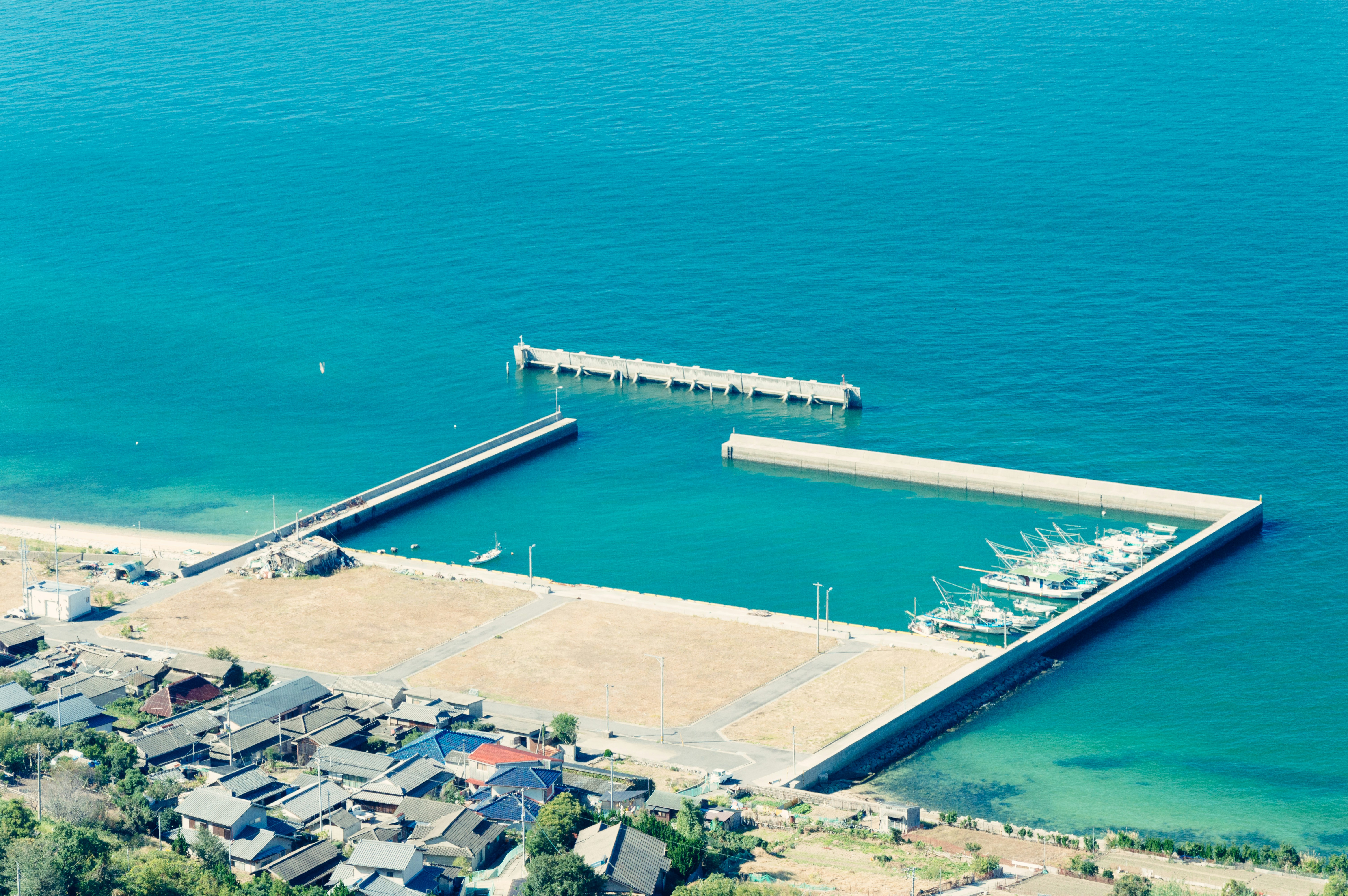 Vue aérienne d’un quai photo – Photo Bleu Gratuite sur Unsplash