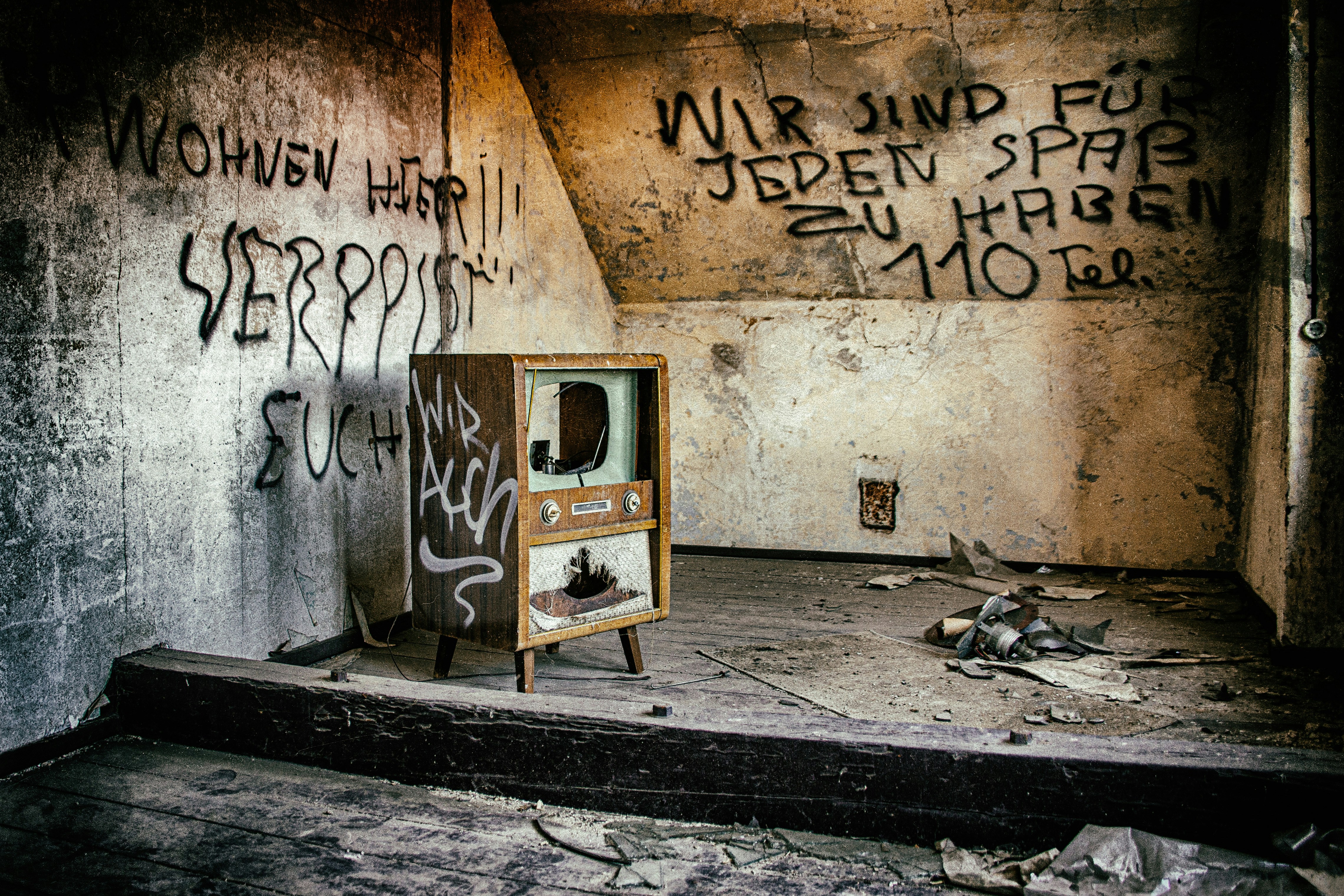 Echoes of a Lost Broadcast in a Graffiti-Scarred Room