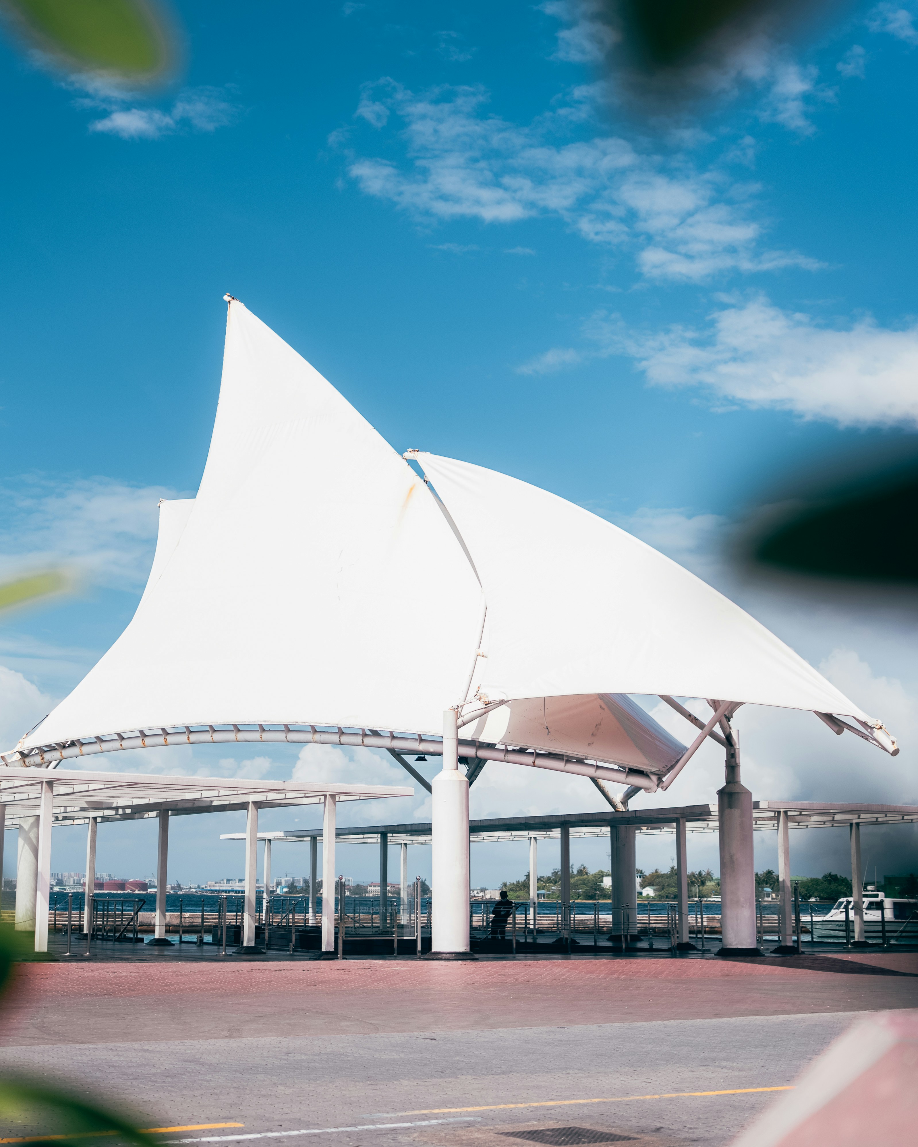 Sculpted Sail Canopy Rises Over Waterfront Promenade