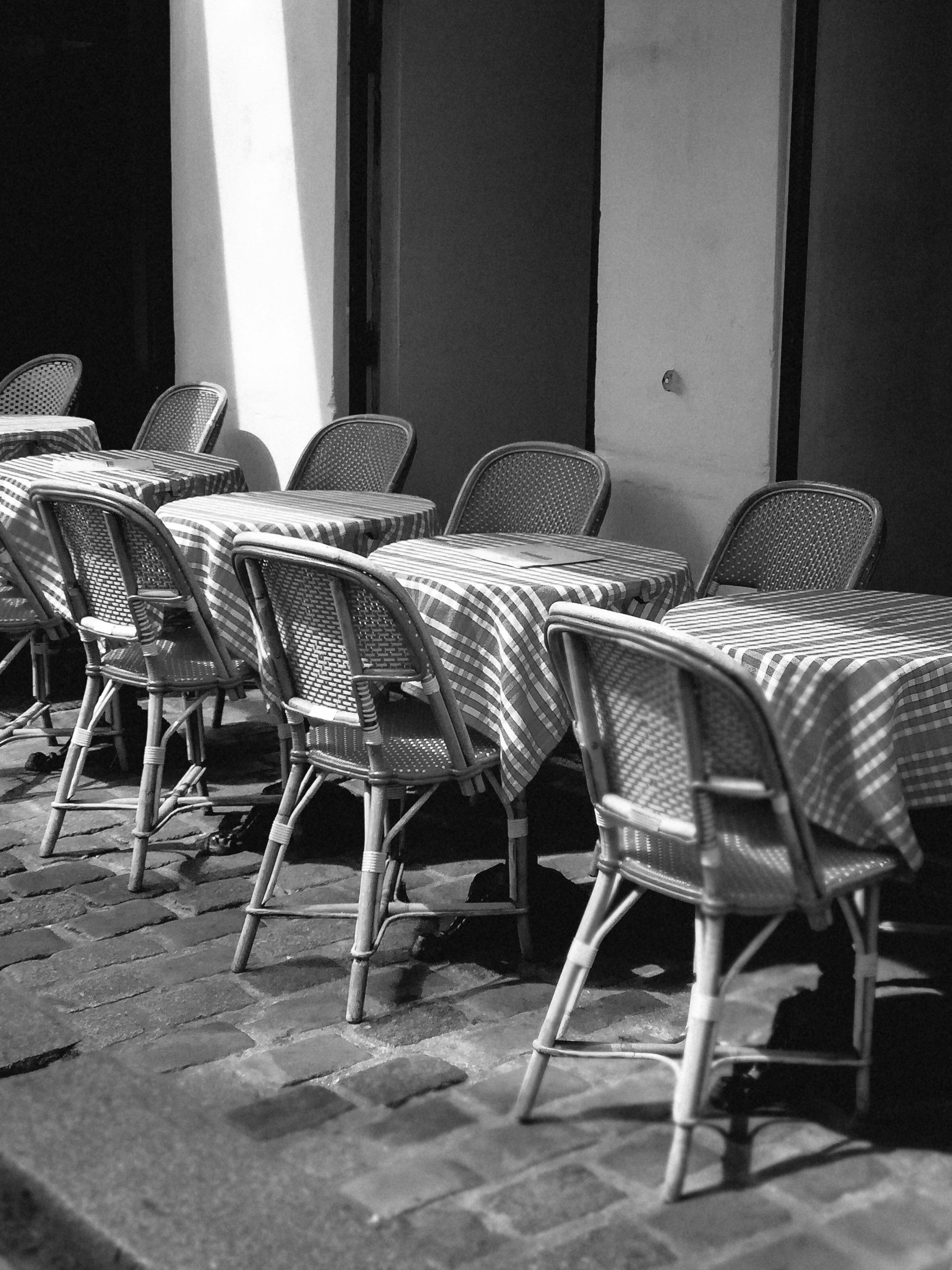 Grayscale photo of empty chairs photo – Free France Image on Unsplash